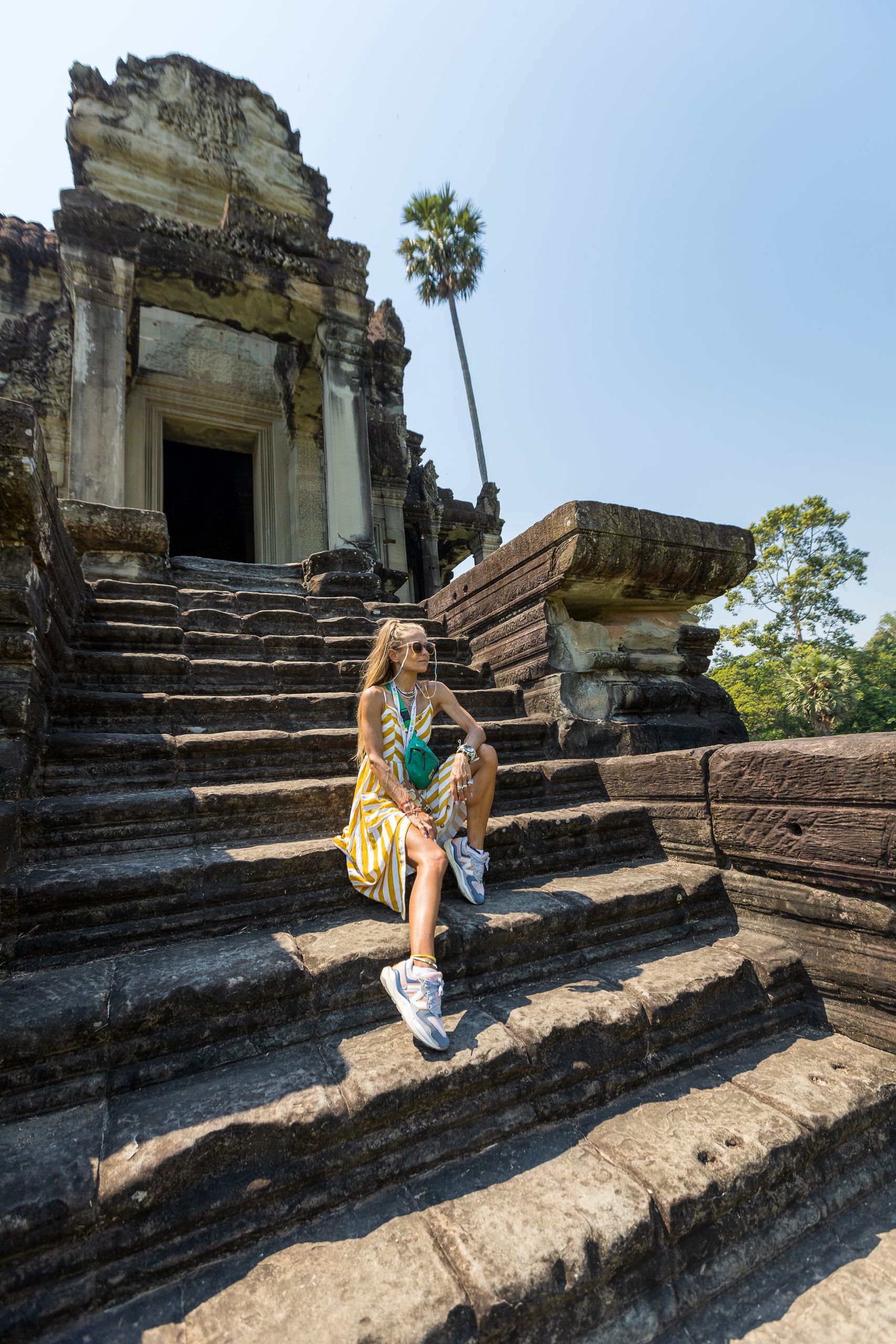 Woman on the Steps of an Ancient Temple · Free Stock Photo
