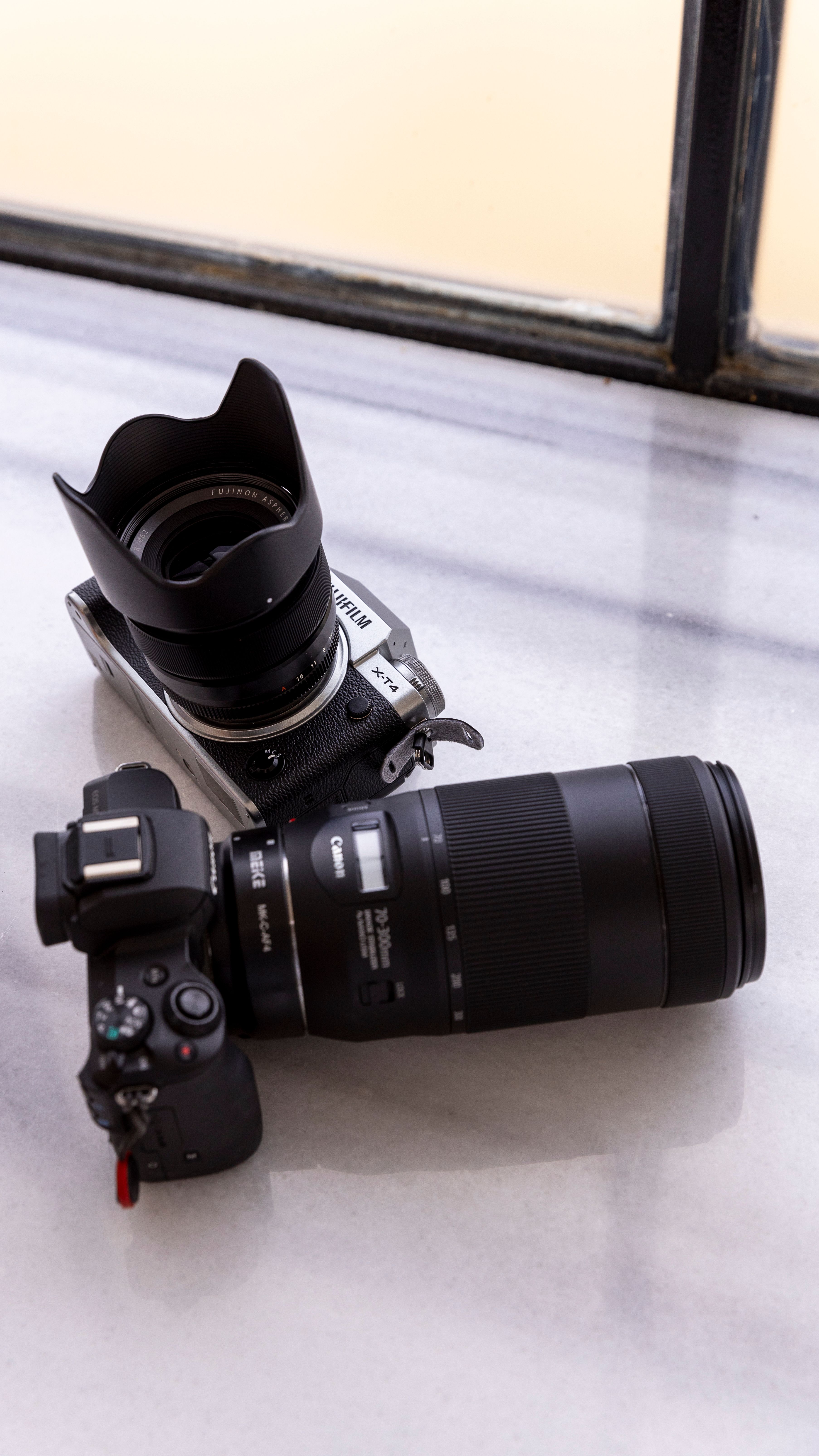 Professional Cameras on Table · Free Stock Photo