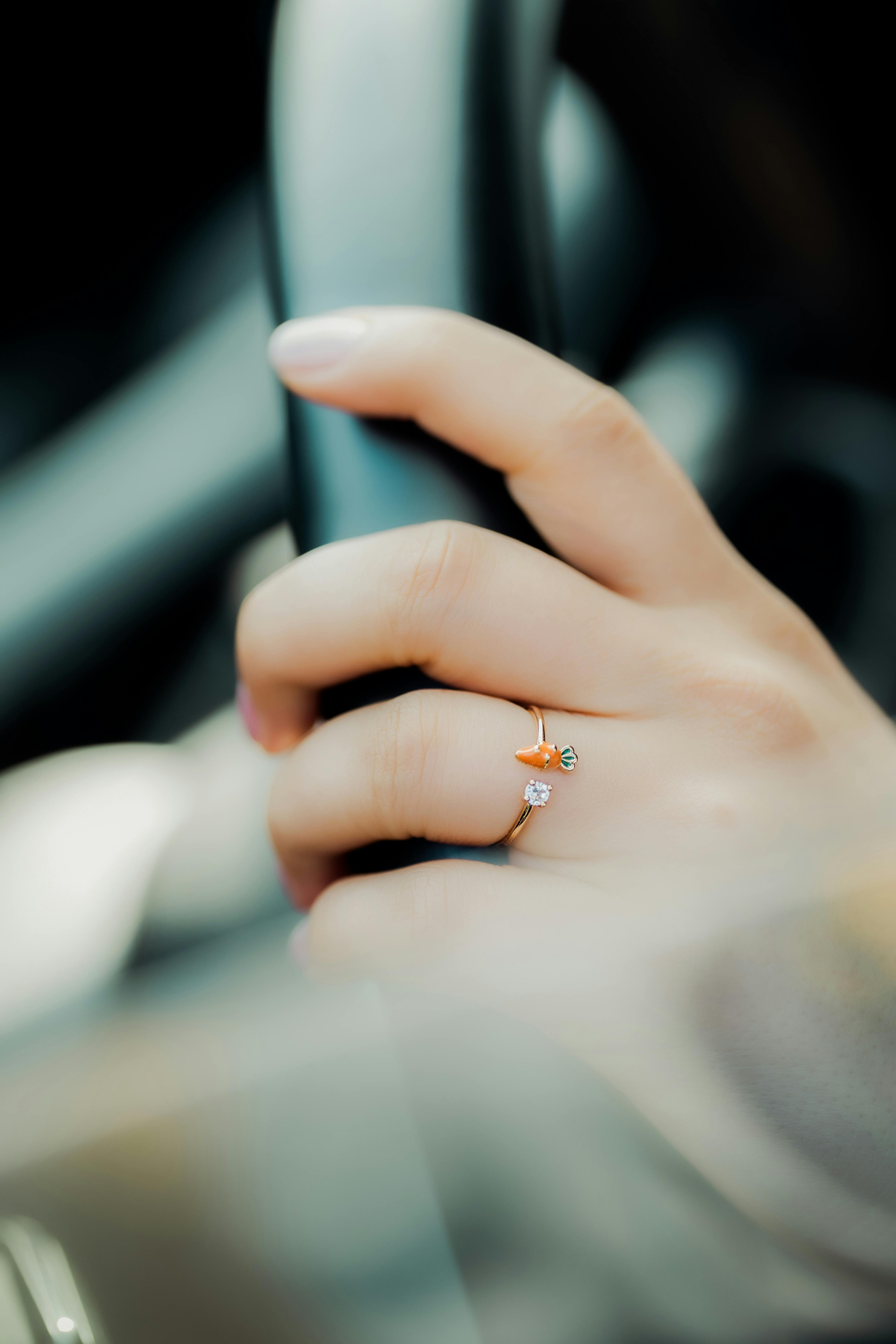 Person Wearing Silver Rings · Free Stock Photo