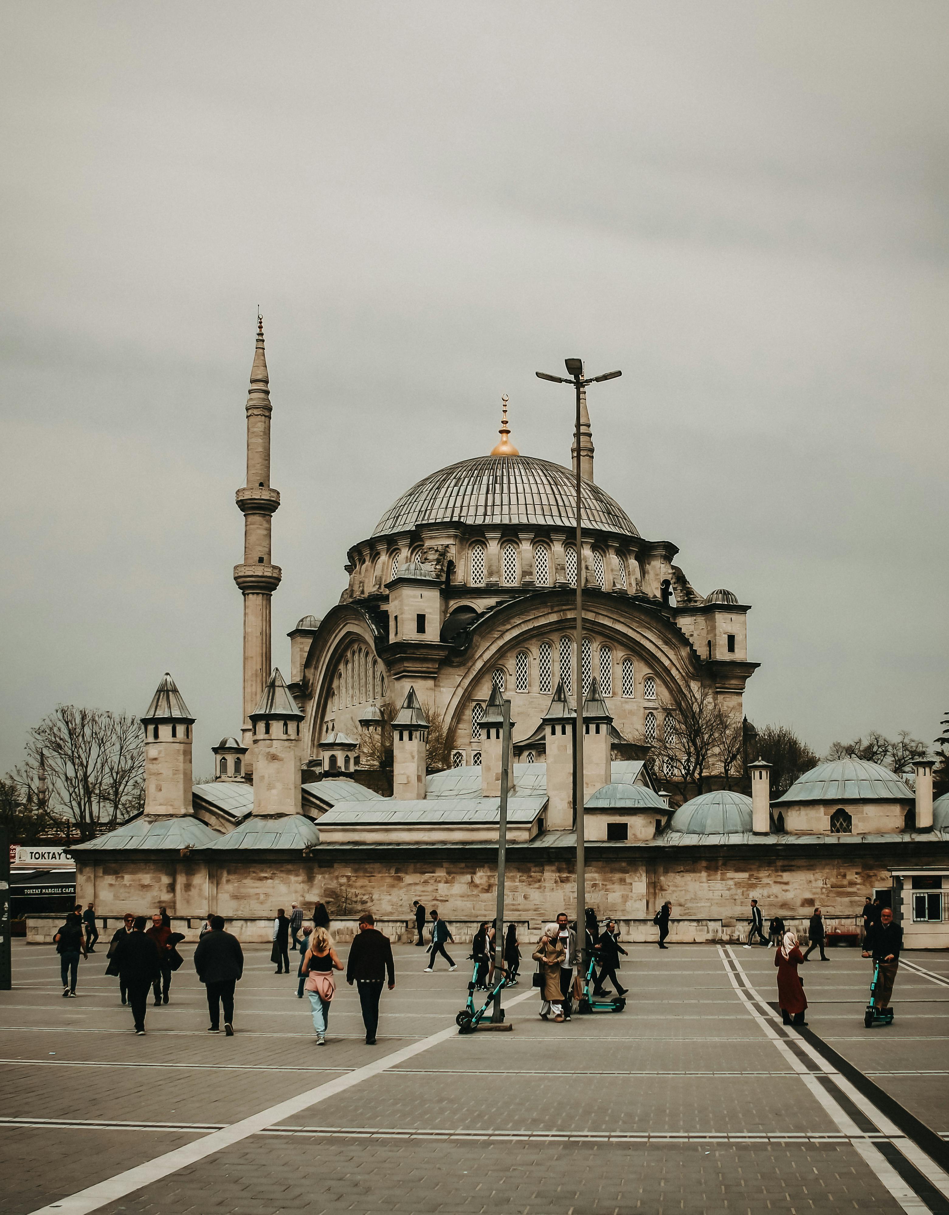 People walking around a mosque in turkey · Free Stock Photo