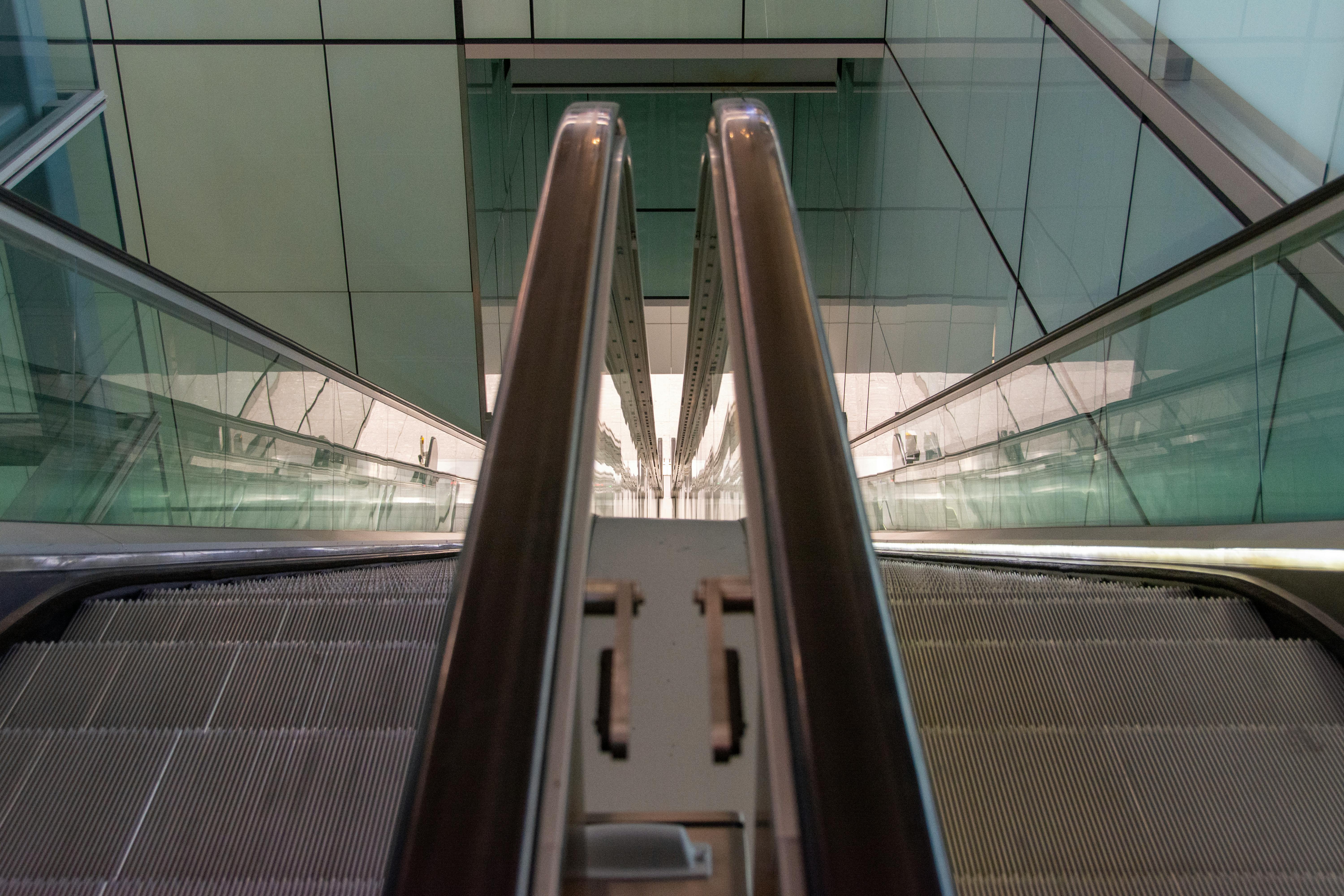 Escalator in Diminishing Perspective · Free Stock Photo