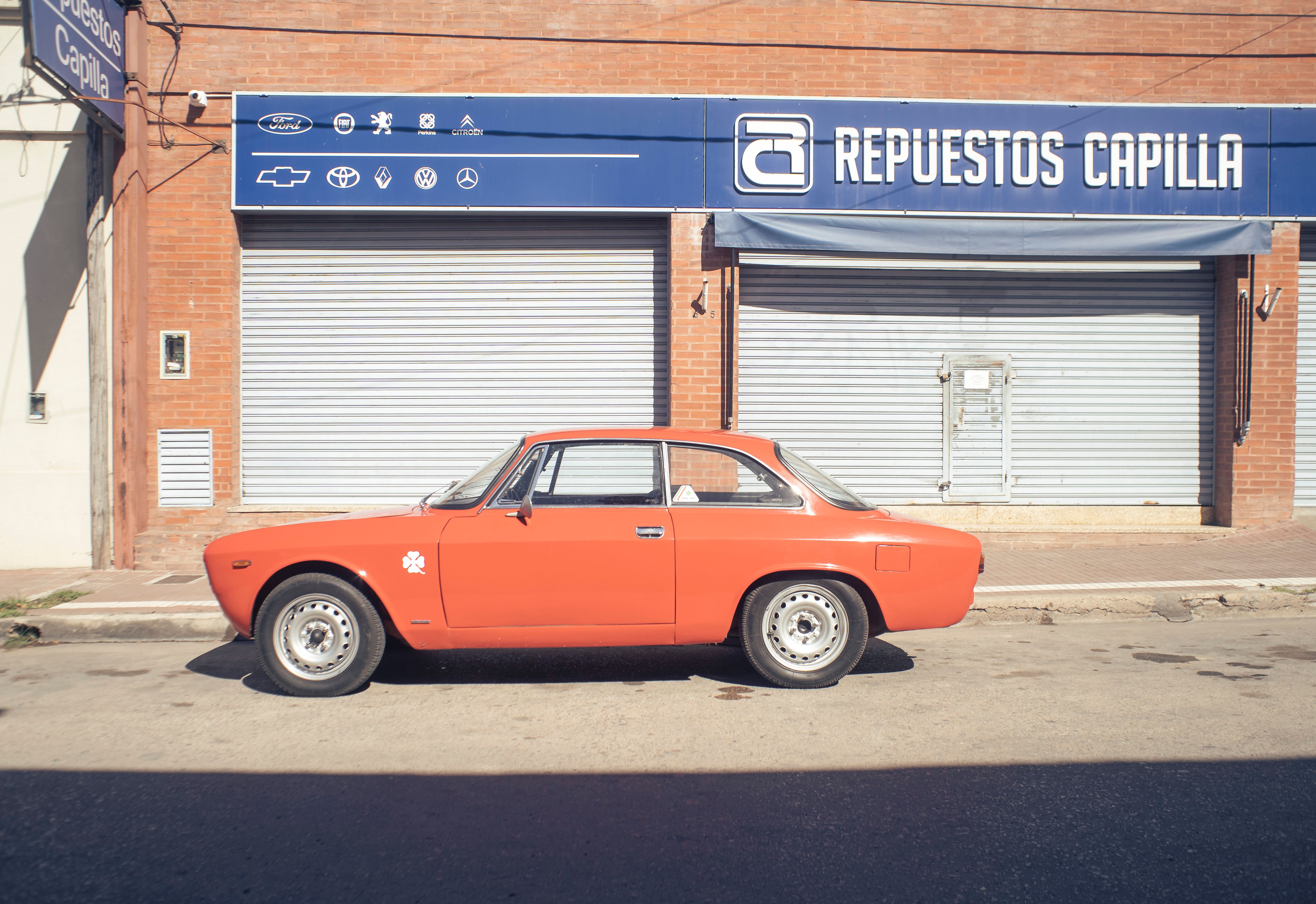Red Alfa Romeo 105 on Street · Free Stock Photo