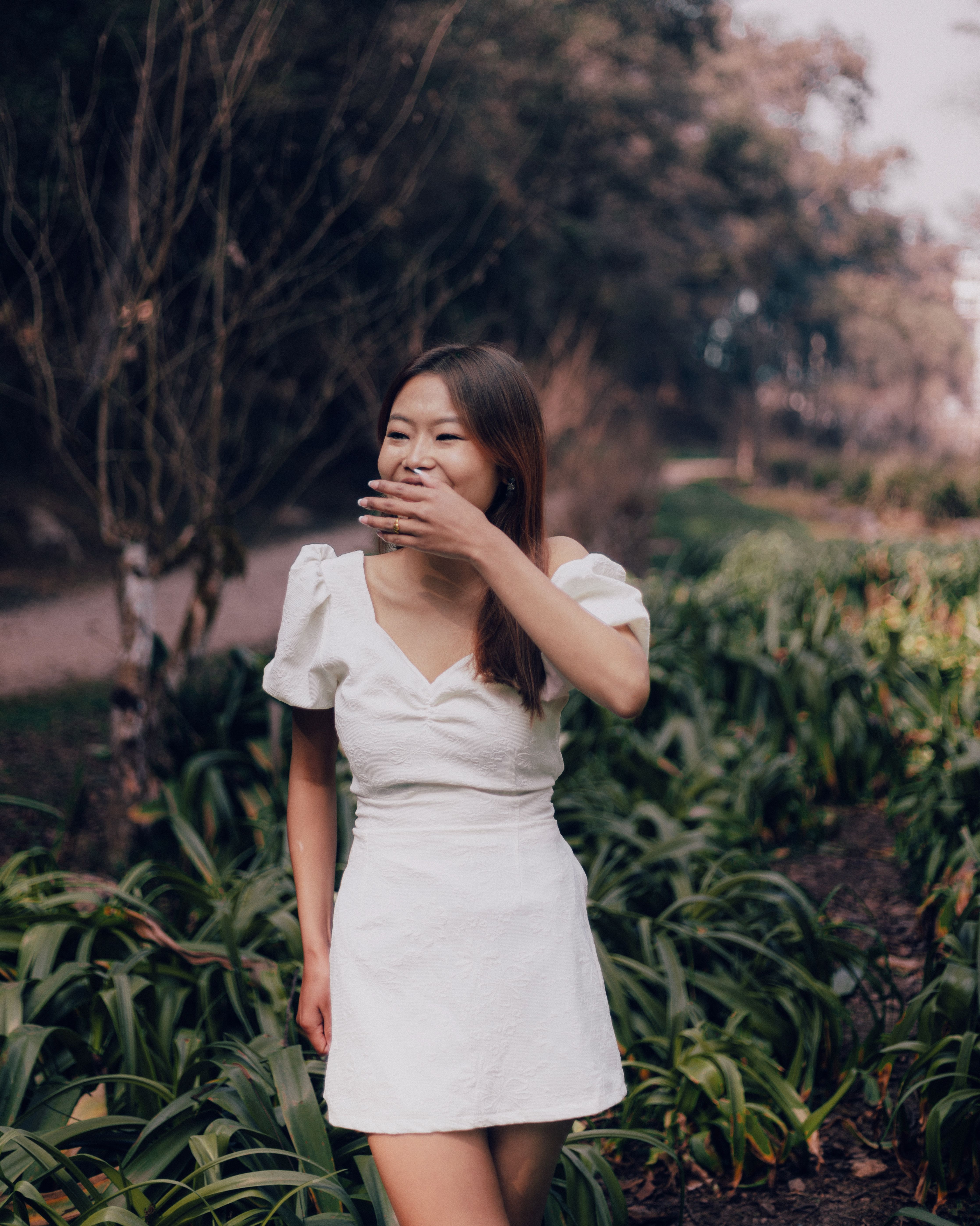 Laughing Woman in White Clothes · Free Stock Photo