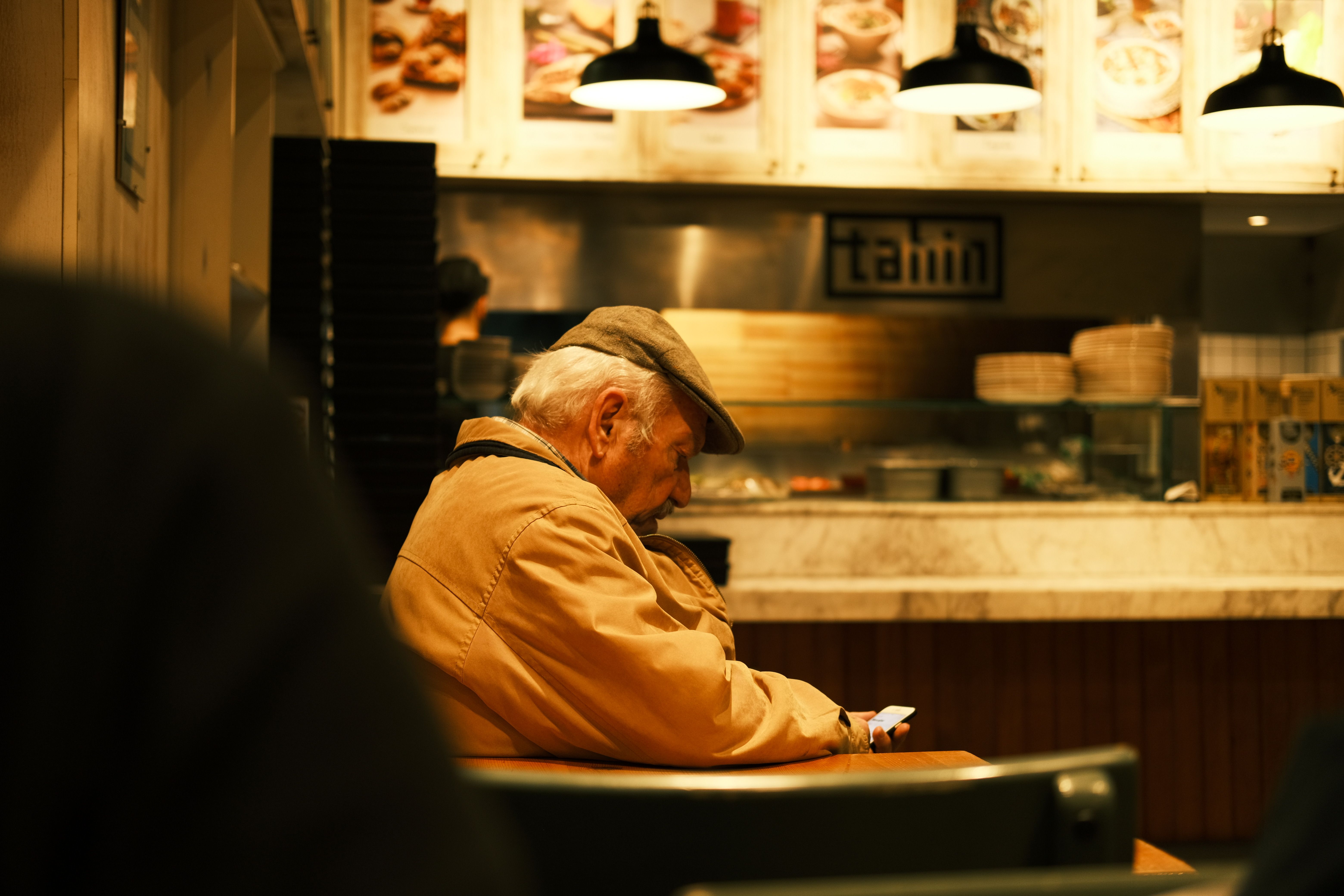 Old Man Sitting At Bar Counter Photos, Download The BEST Free Old Man ...