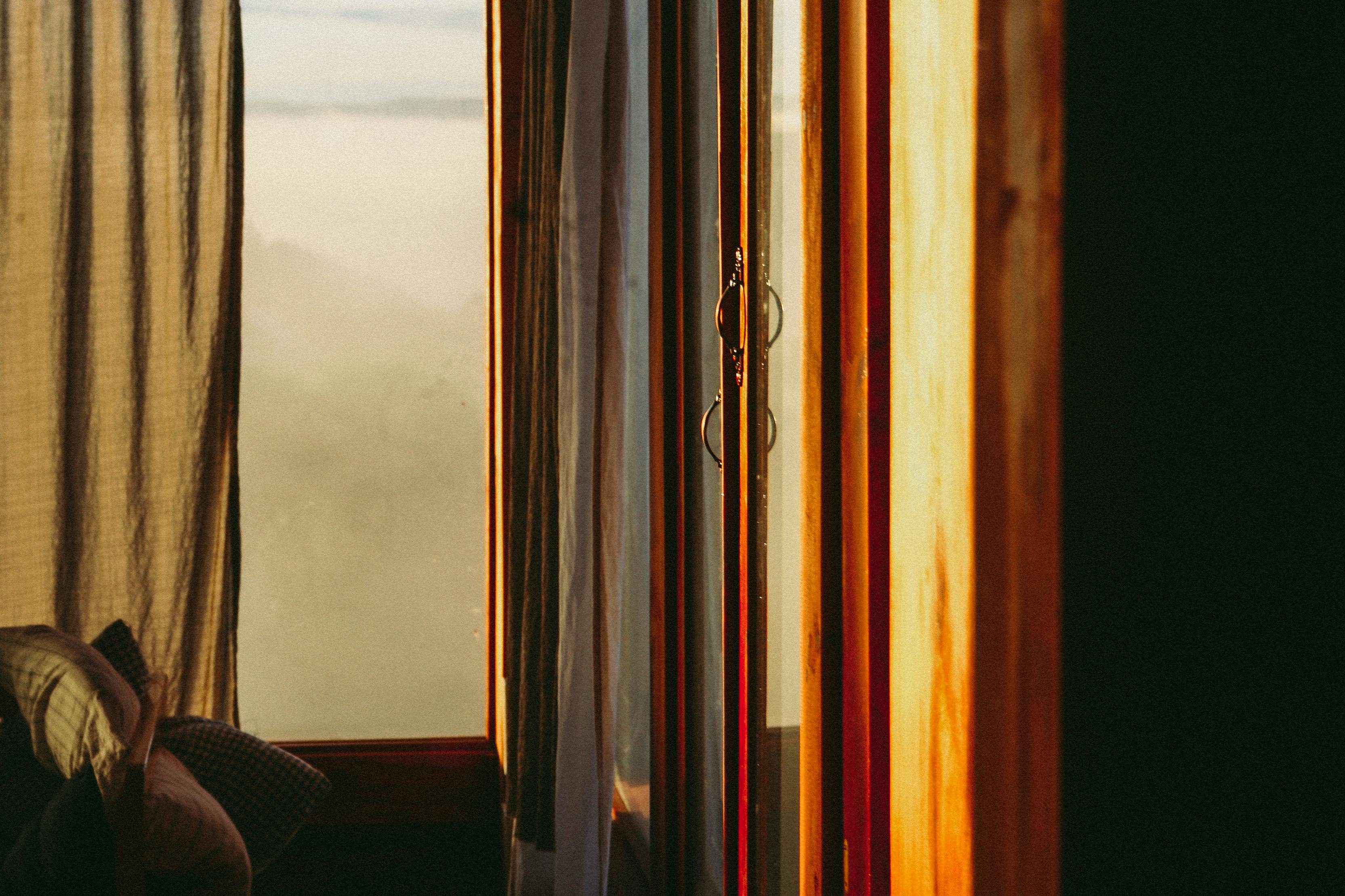 Table Beside Window Curtain · Free Stock Photo