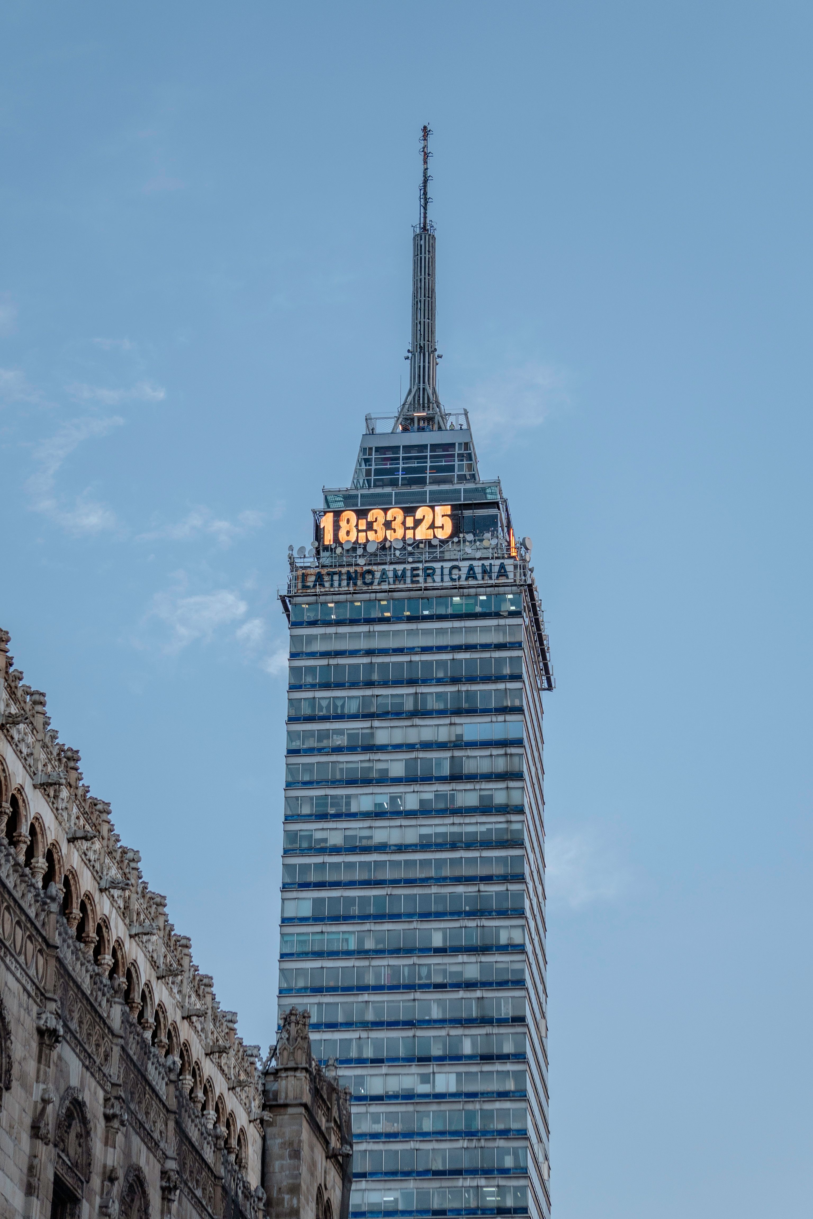 Clock on Top of Torre Latinoamericana against Blue Sky in Mexico City ...