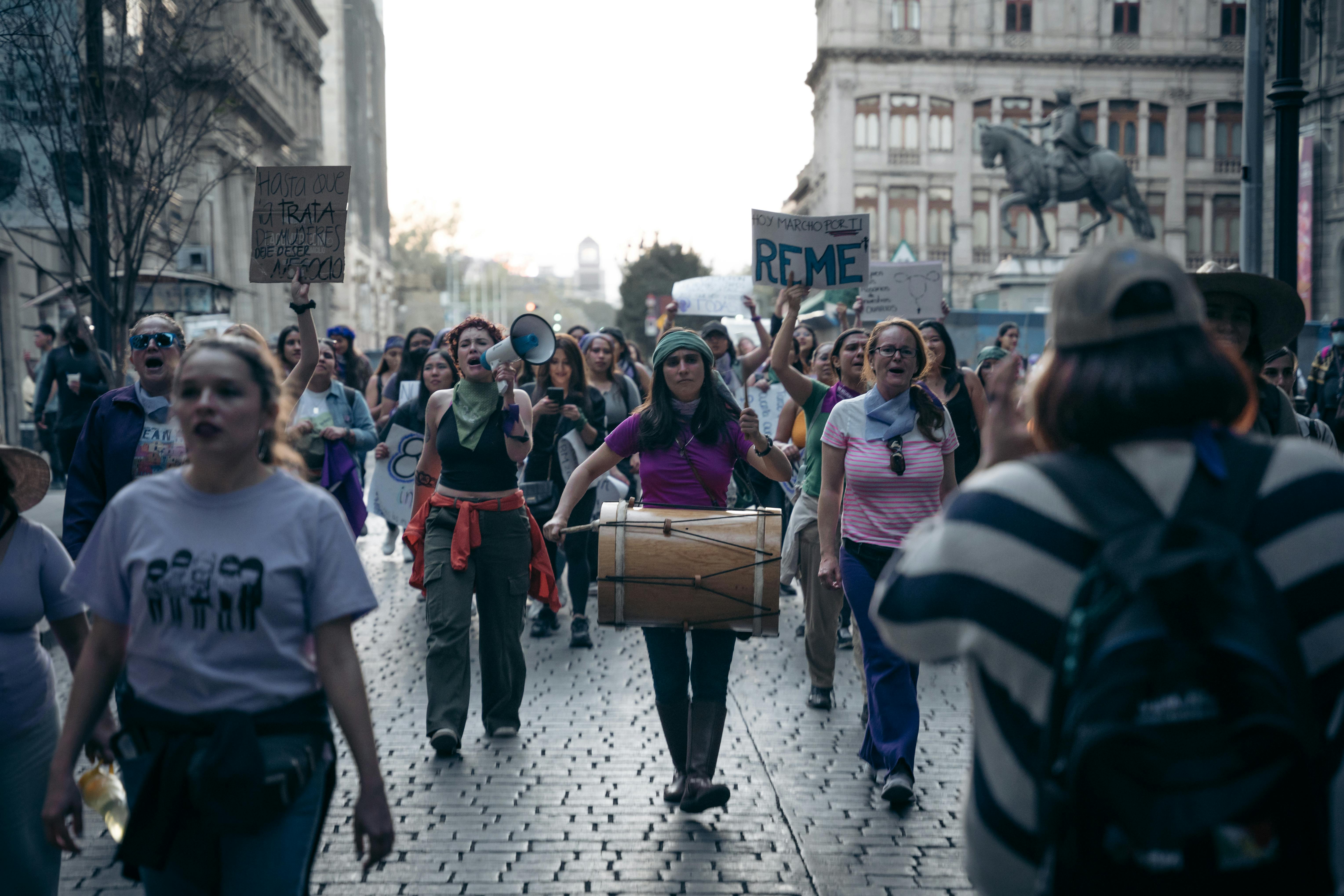 Woman with Drum at Protest · Free Stock Photo