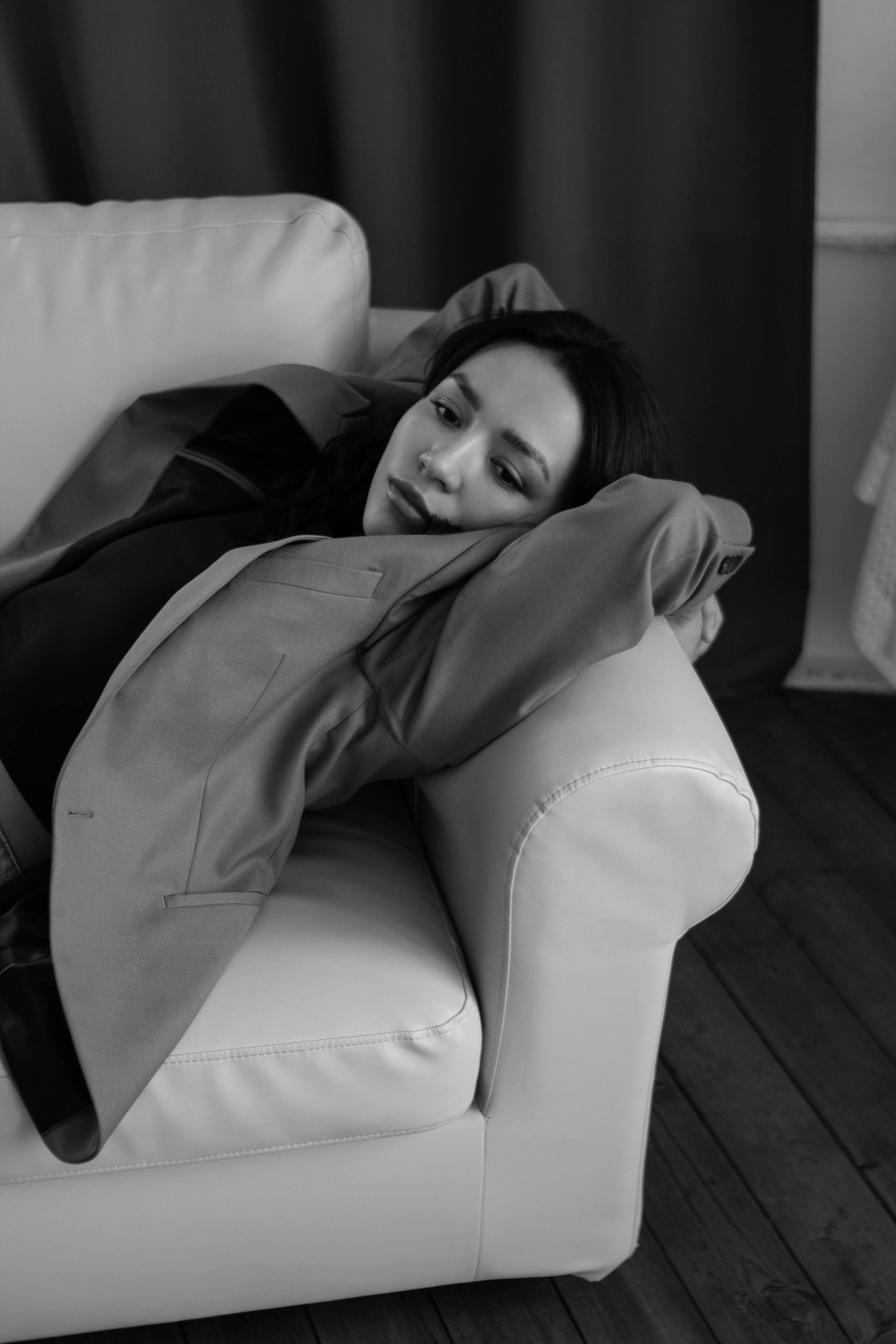 Young Woman Touching Her Temple · Free Stock Photo