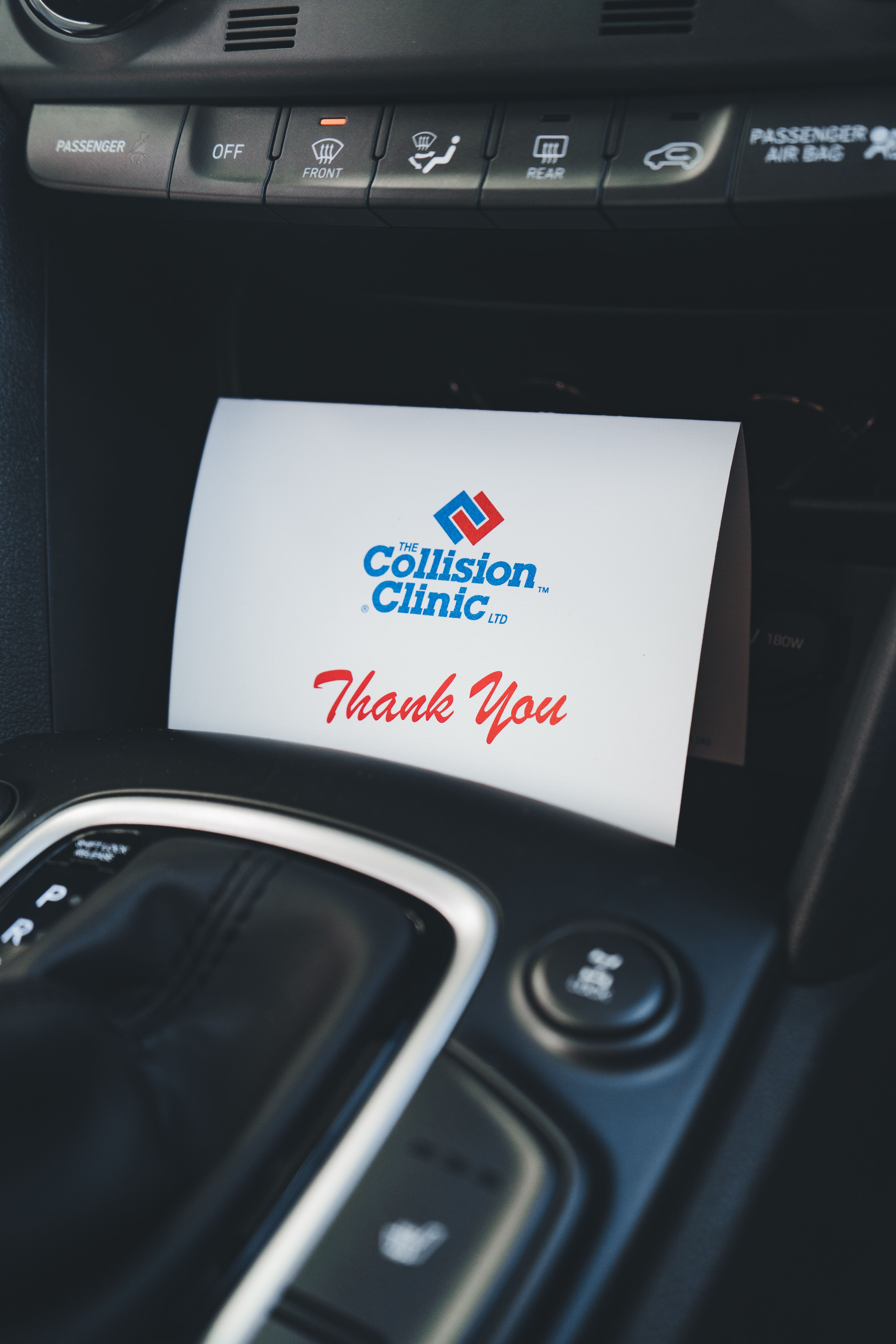 A Card in a Storage Compartment in a Car · Free Stock Photo