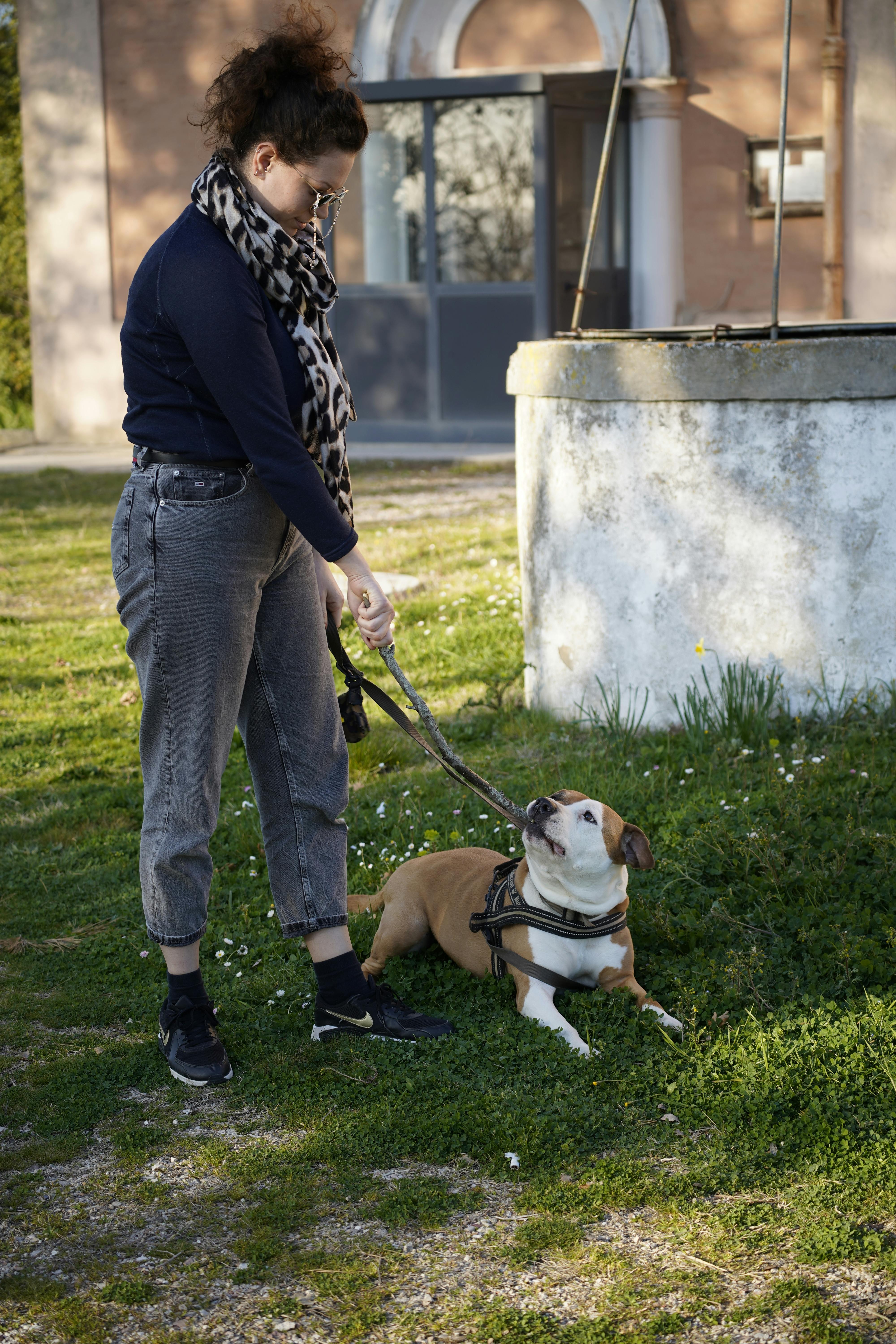 Woman Walking with Dog · Free Stock Photo