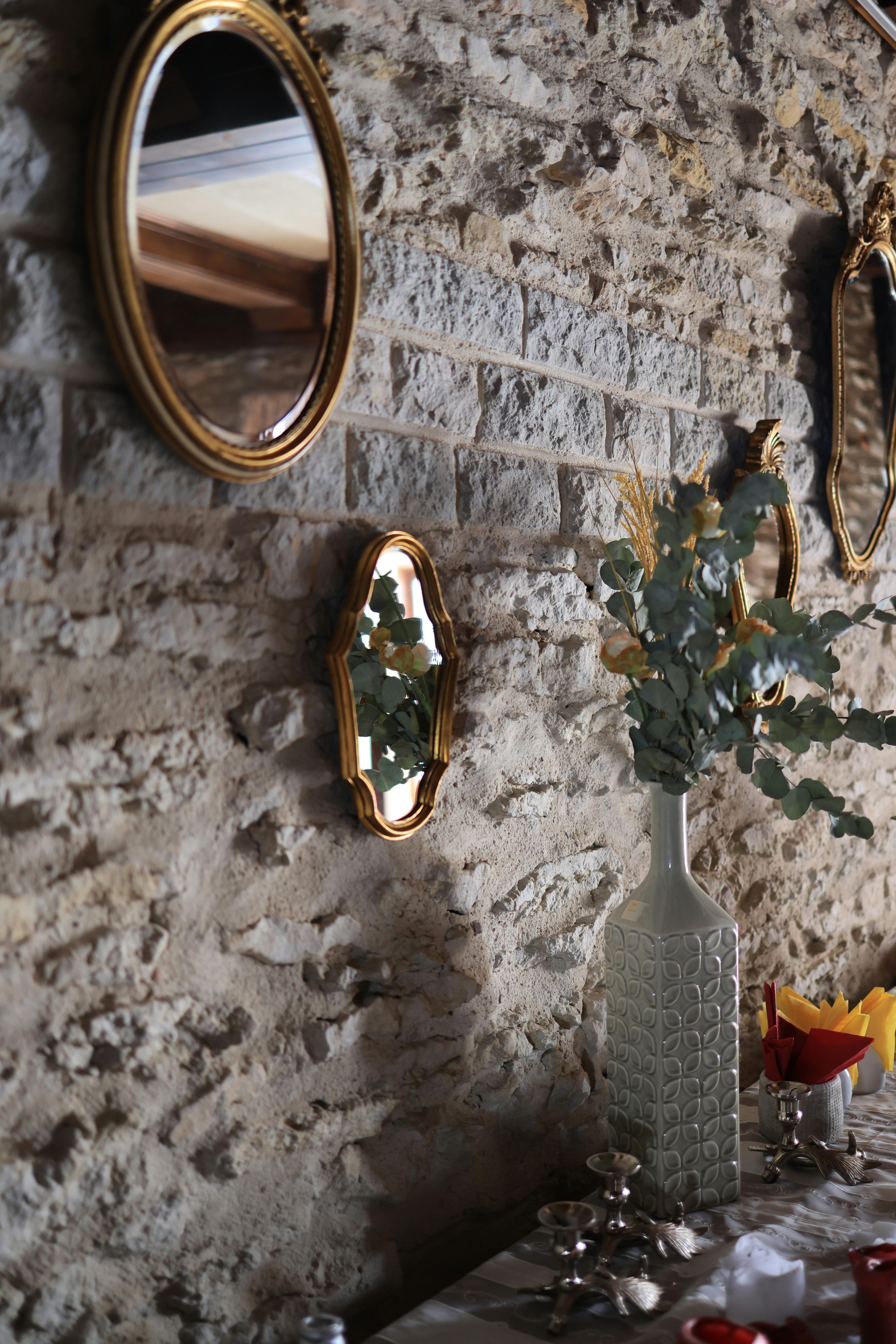 Mirrors on Stone Wall · Free Stock Photo