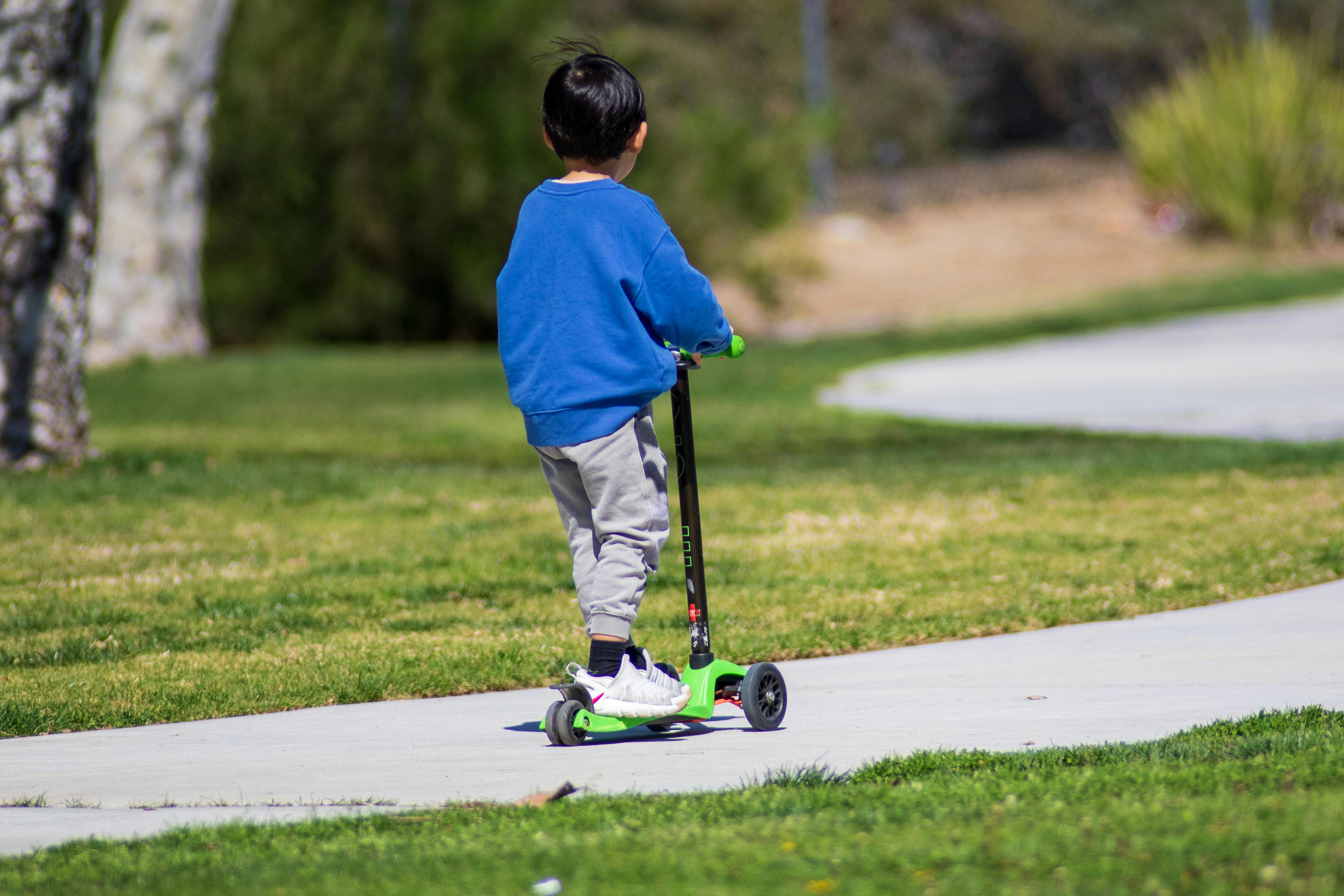 Child on Scooter · Free Stock Photo