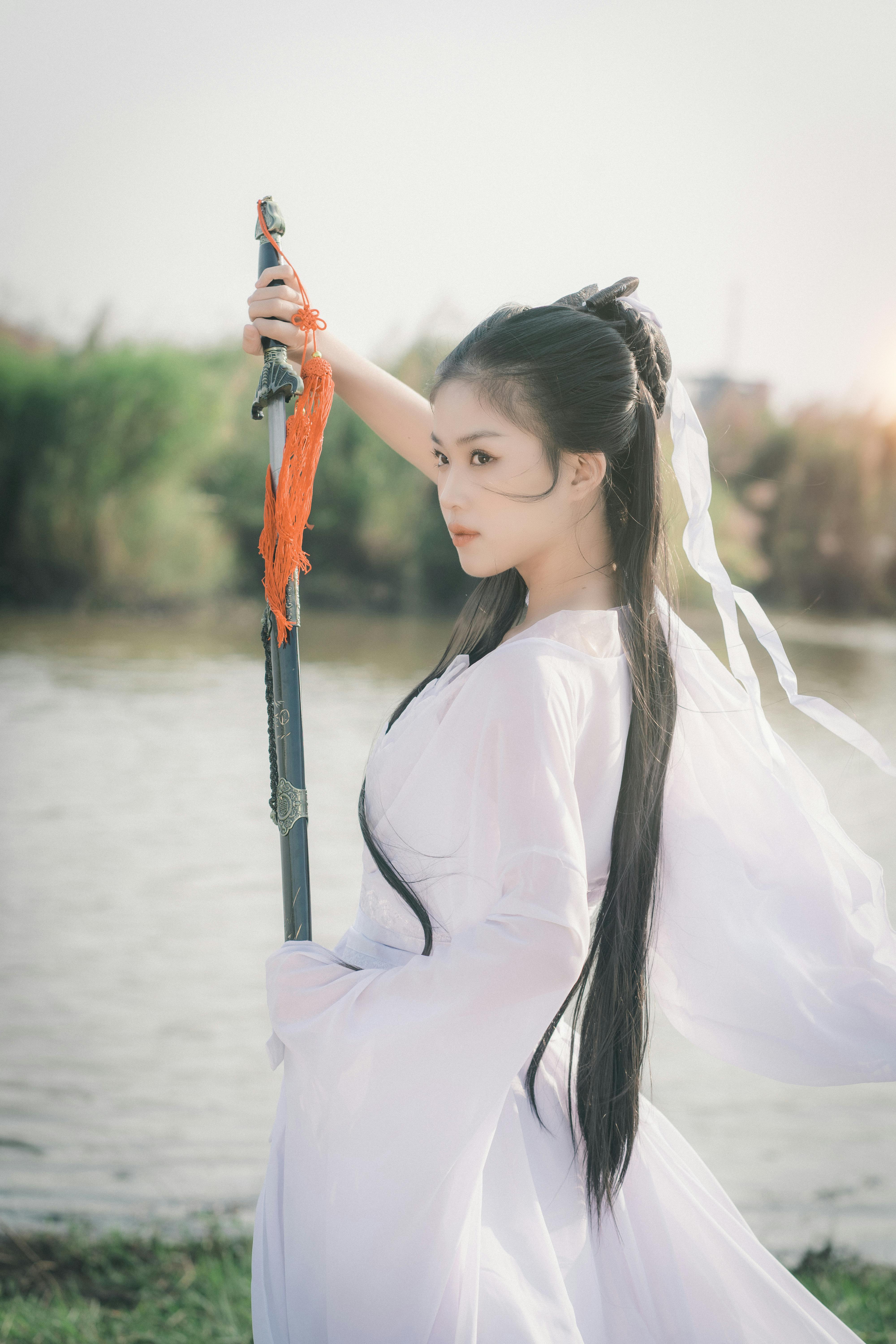 Photo of a Woman with a Sword · Free Stock Photo