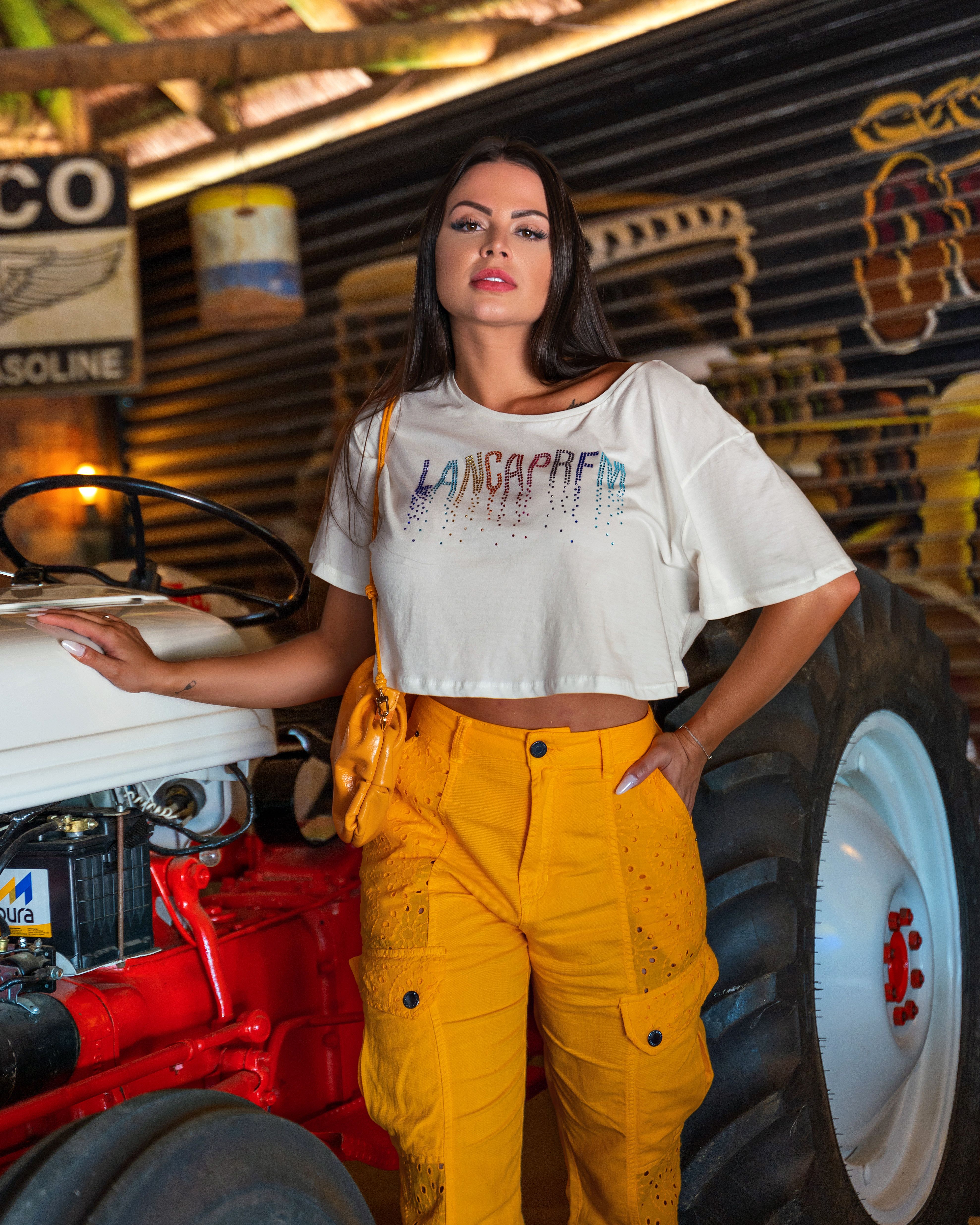 Woman Posing by Tractor · Free Stock Photo