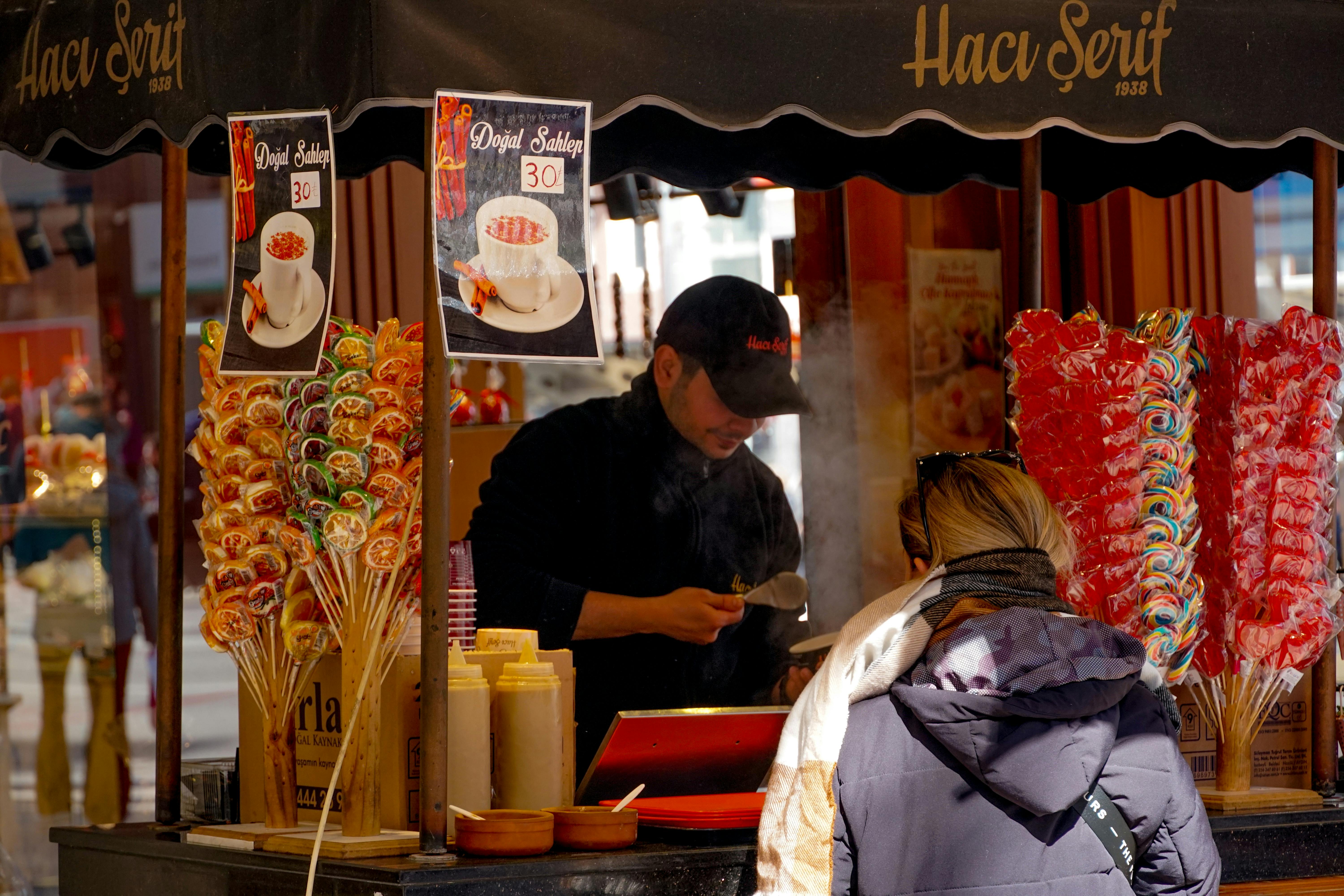 Man Selling Sweets at the Market · Free Stock Photo