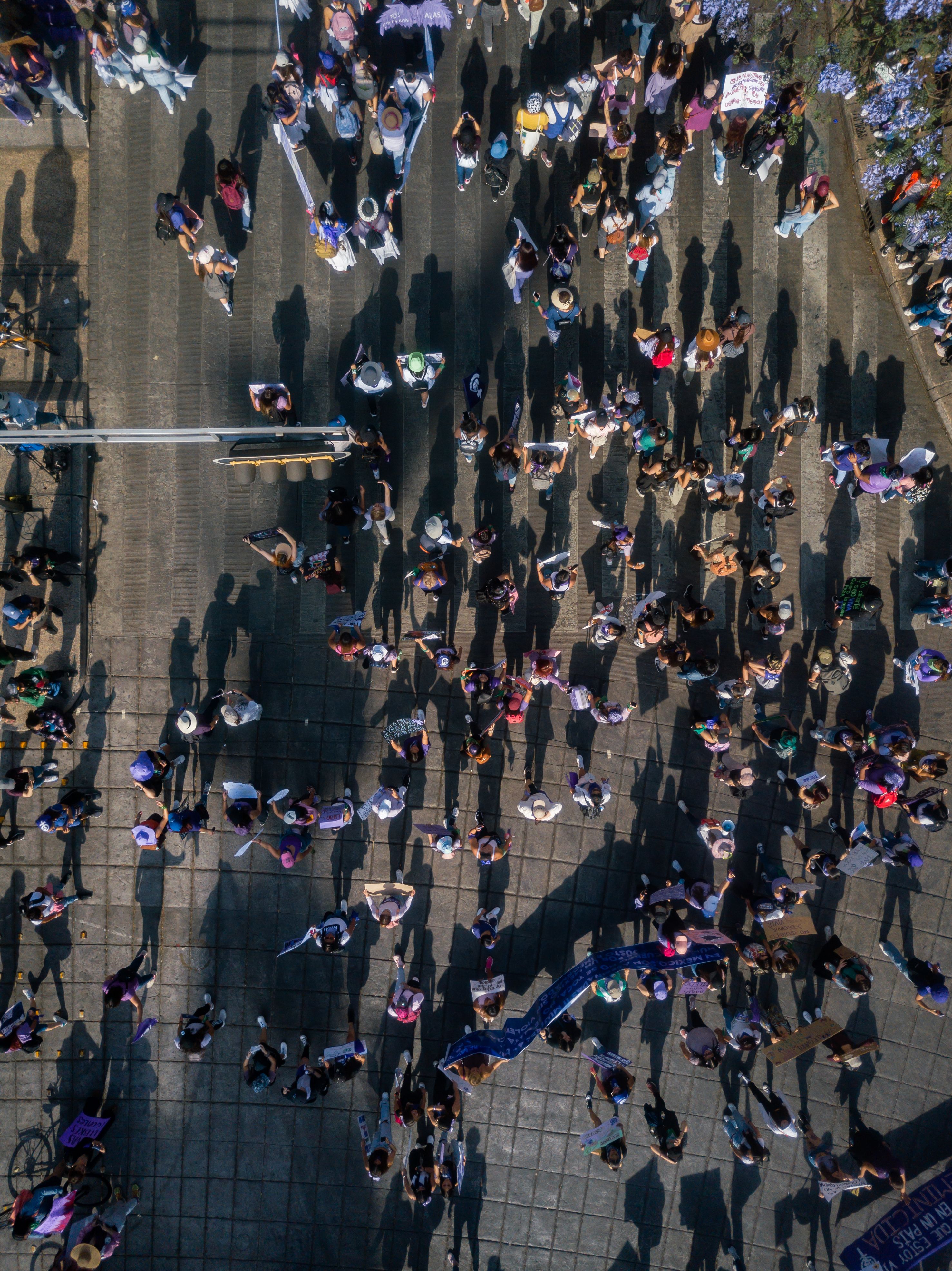 An aerial view of people walking on a street · Free Stock Photo