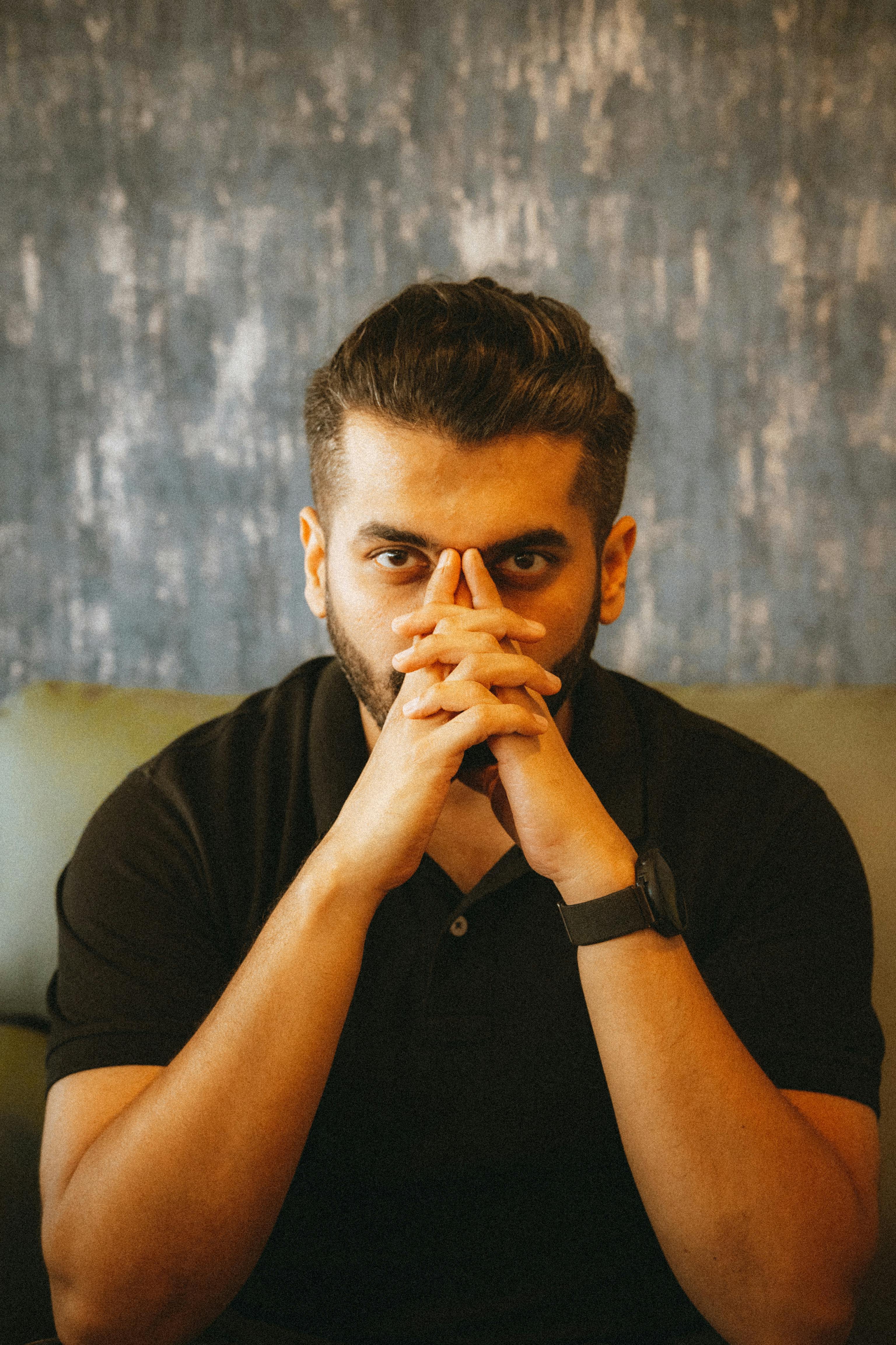 Man Looking at Red Flower · Free Stock Photo
