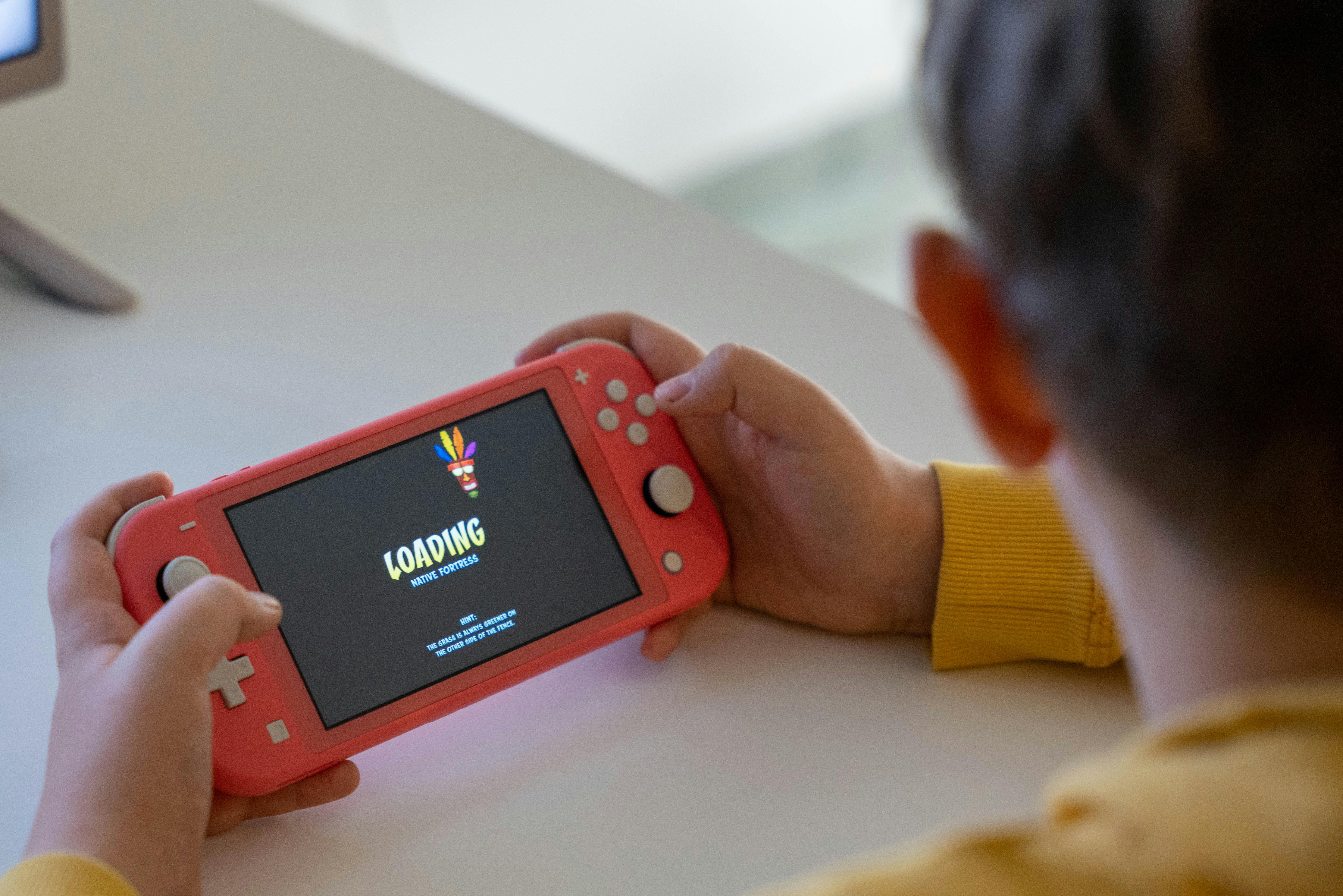 Boy Playing on Switch · Free Stock Photo