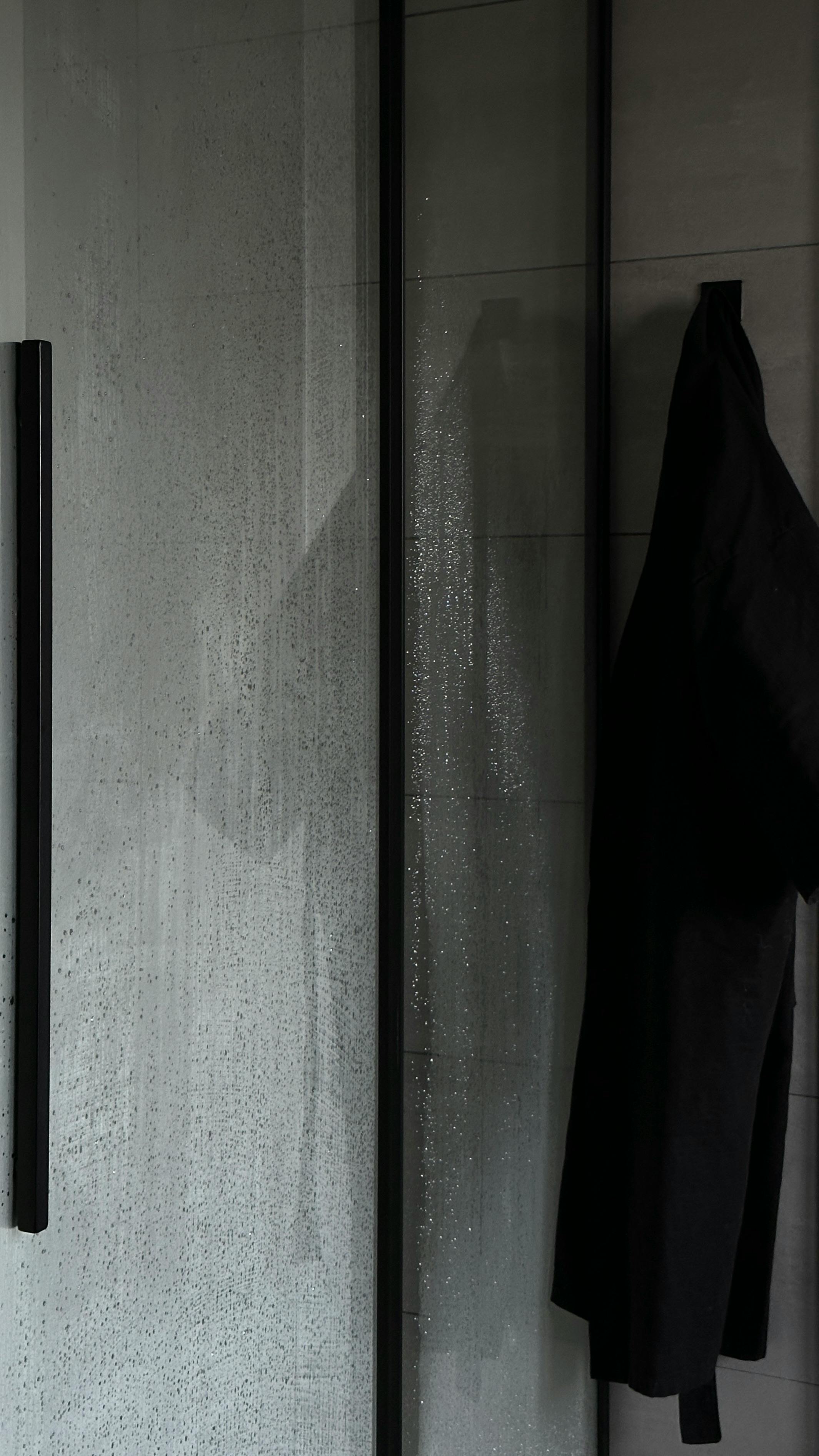 Jacket Hanging on a Wall · Free Stock Photo