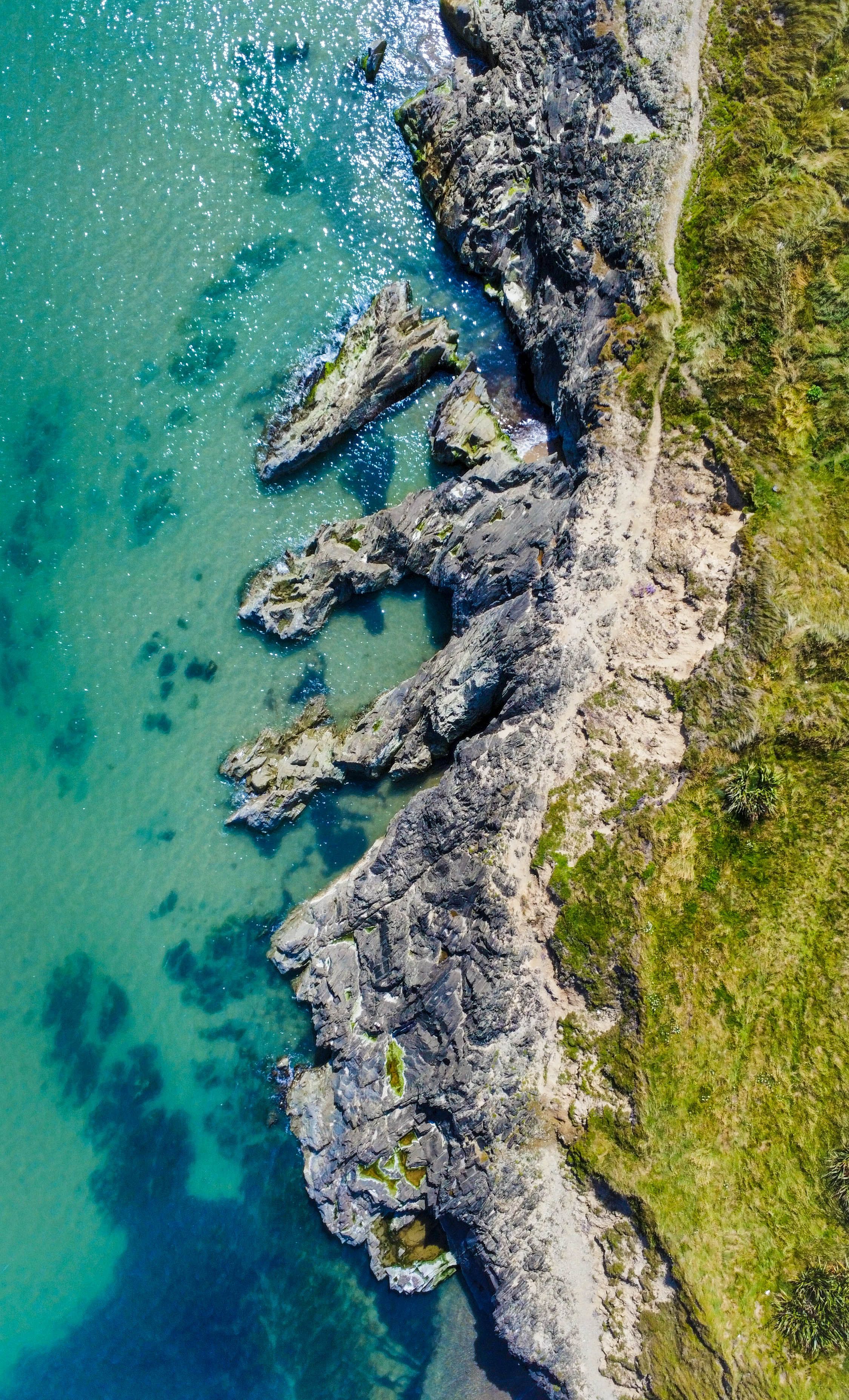 Drone Shot of a Rocky Coastline · Free Stock Photo
