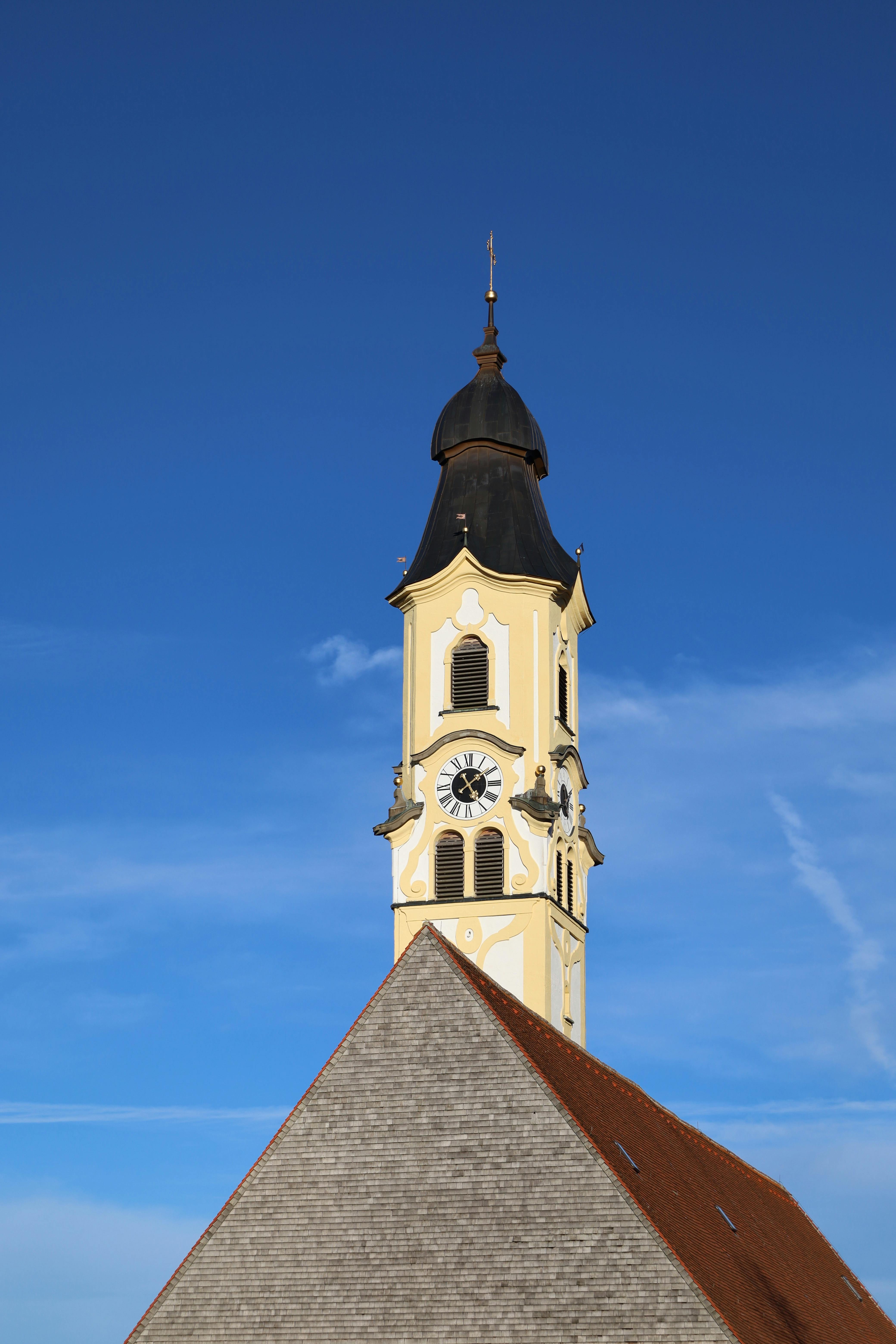 Blue Decorative Church Towers and a Flag · Free Stock Photo