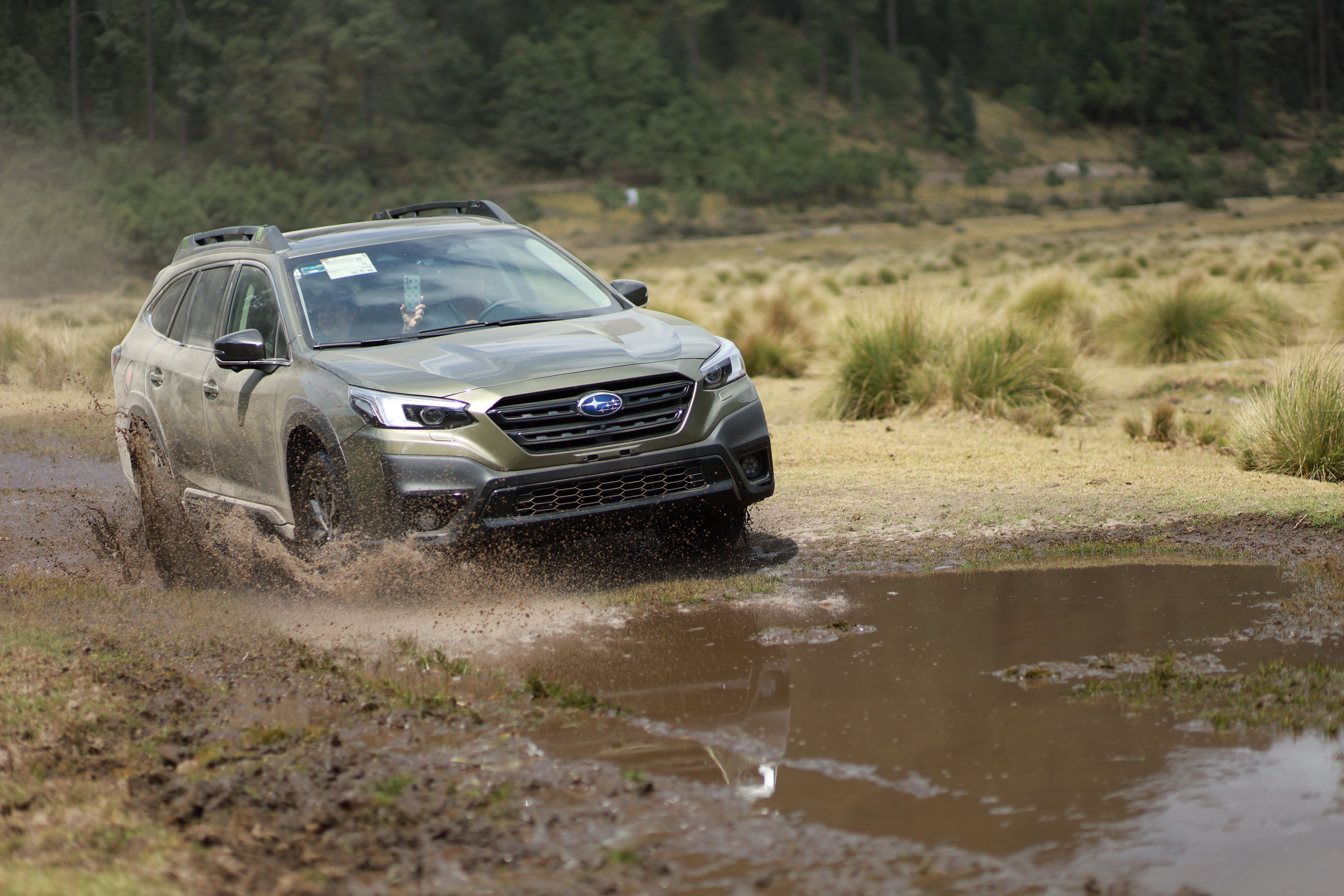Car Driving in Puddle · Free Stock Photo