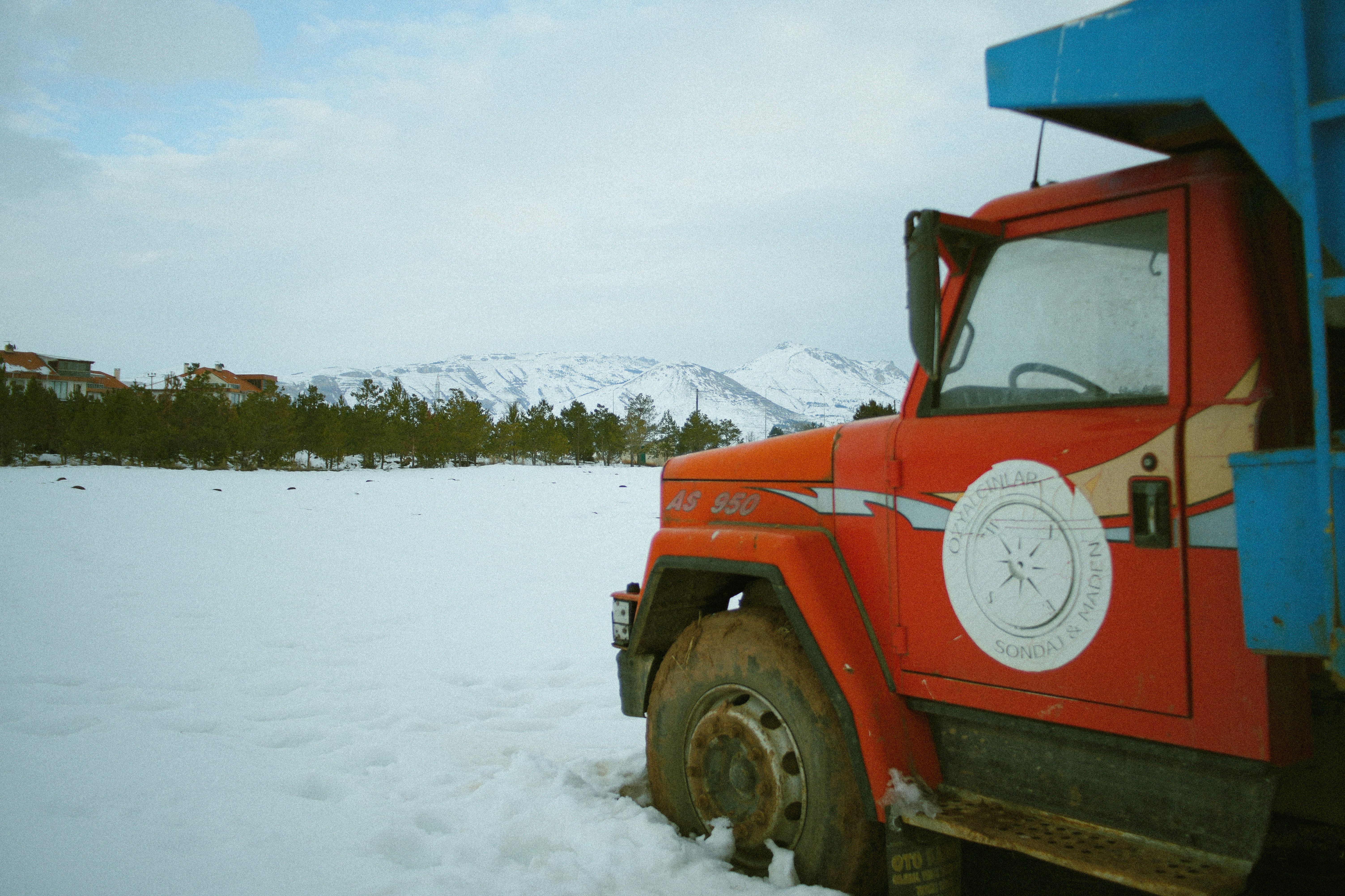 Dump Truck Breaking Through the Snow · Free Stock Photo