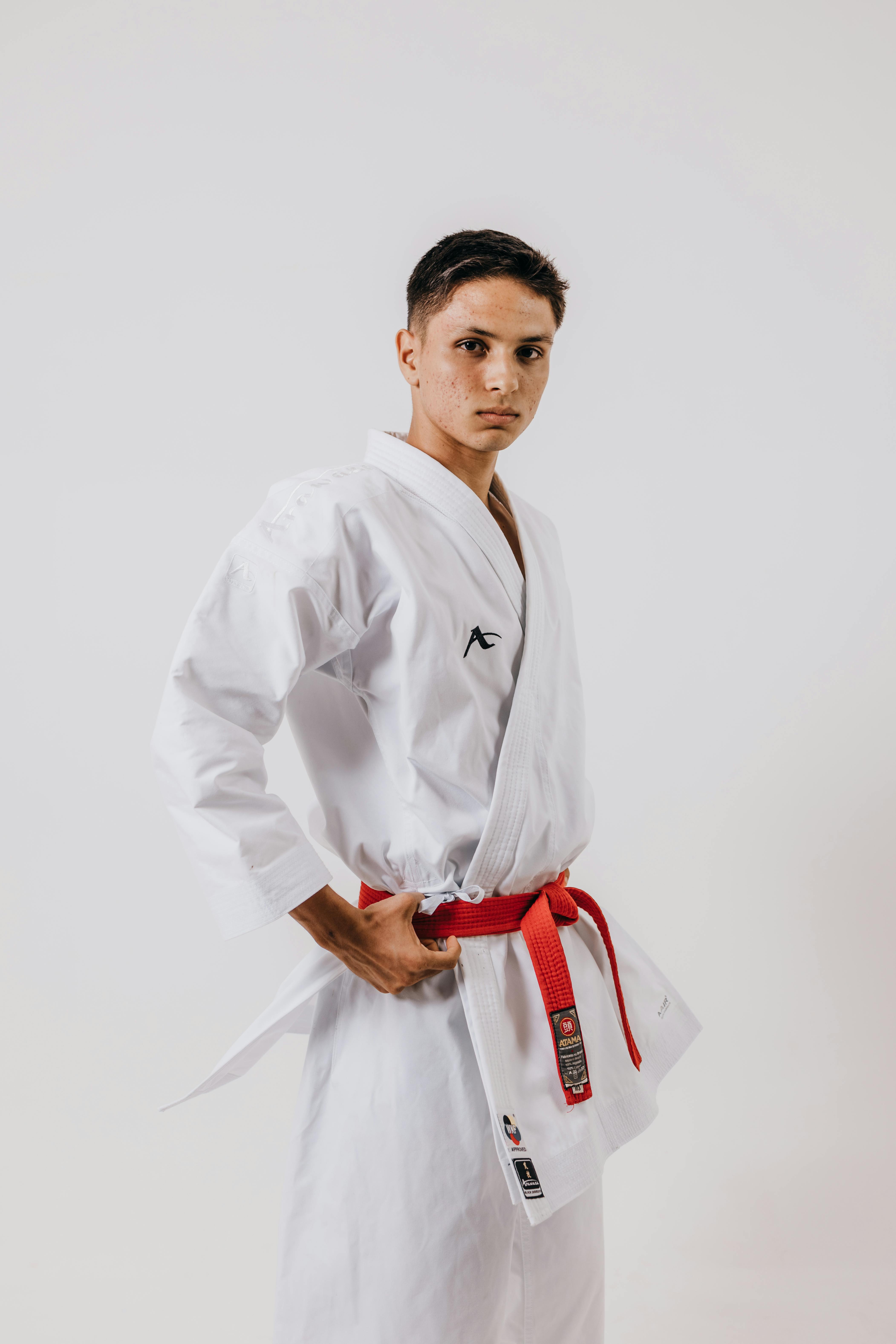 Young Karate Student Holding His Arms Akimbo · Free Stock Photo