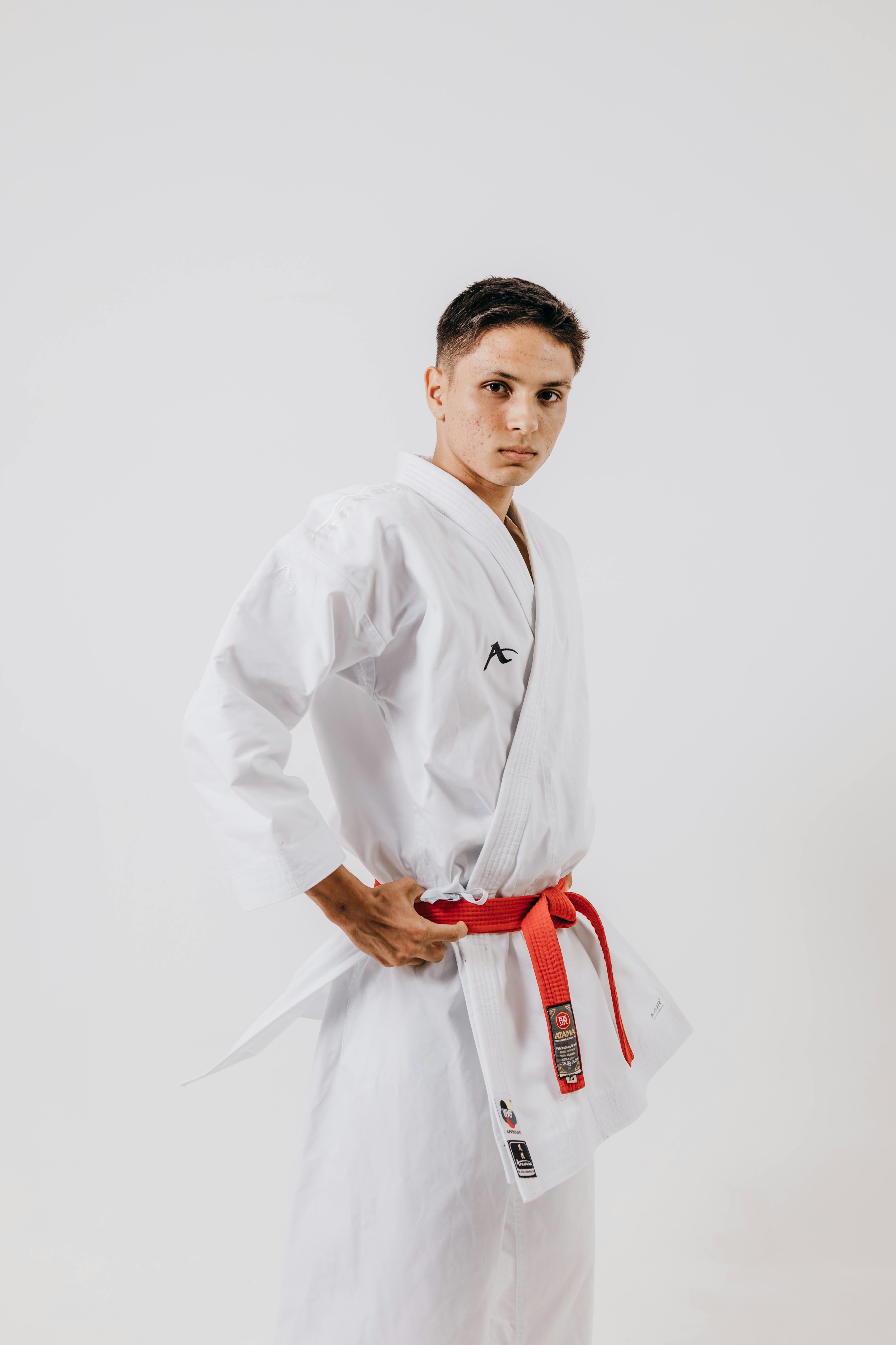 Young Karate Student Holding His Belt · Free Stock Photo