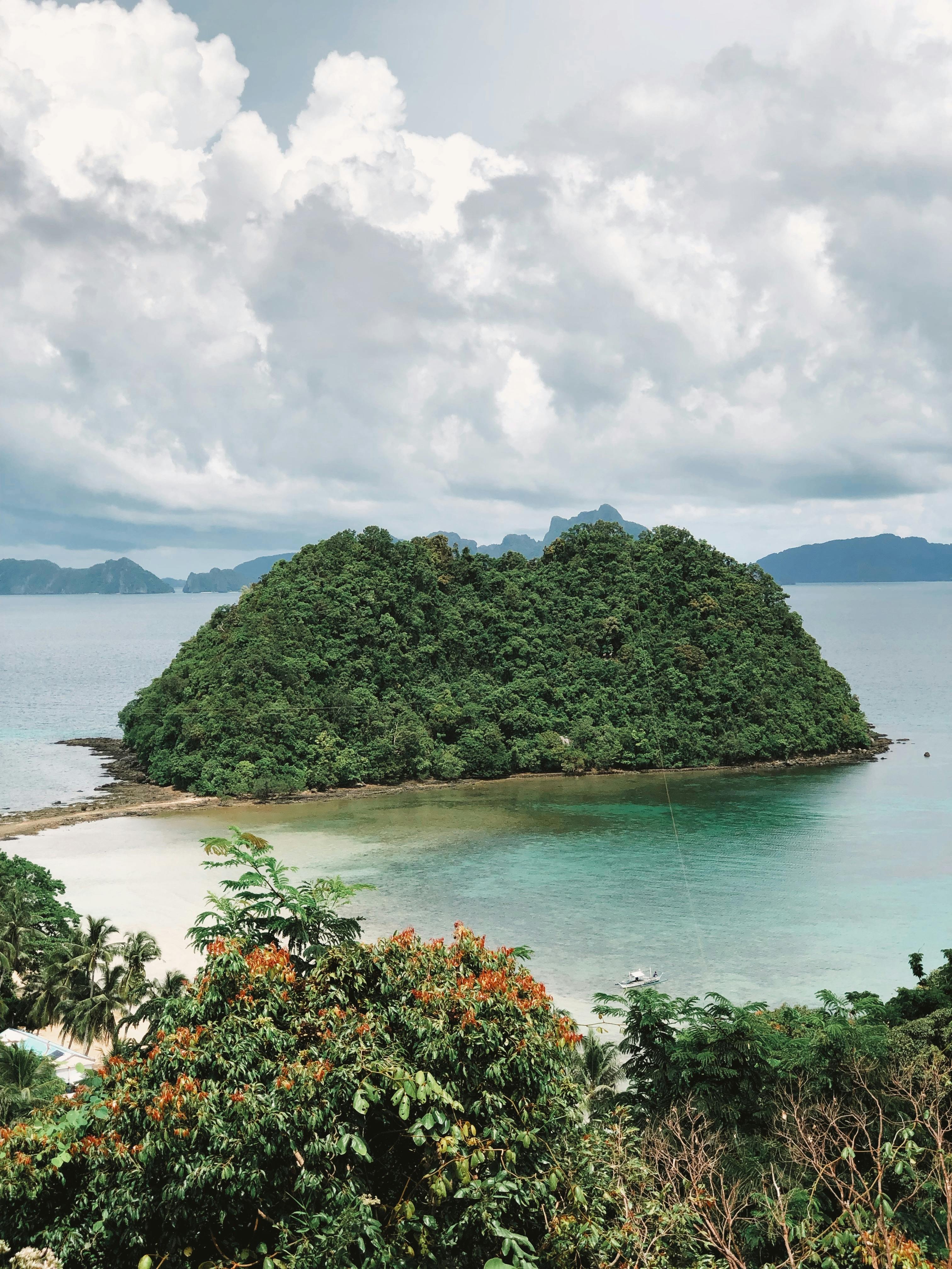 Clouds over Island on Sea Shore · Free Stock Photo
