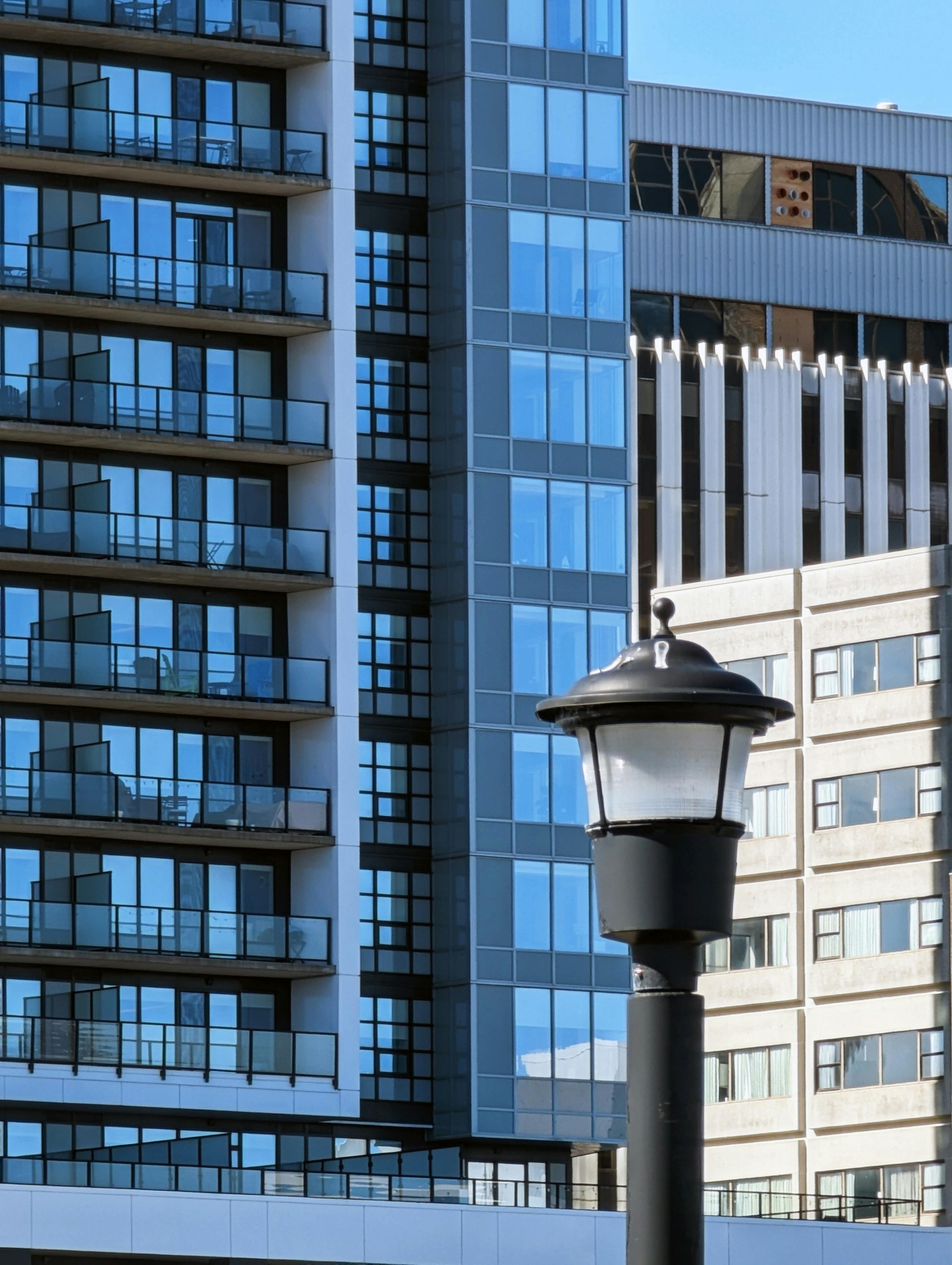 Residential Building behind Street Lamp · Free Stock Photo