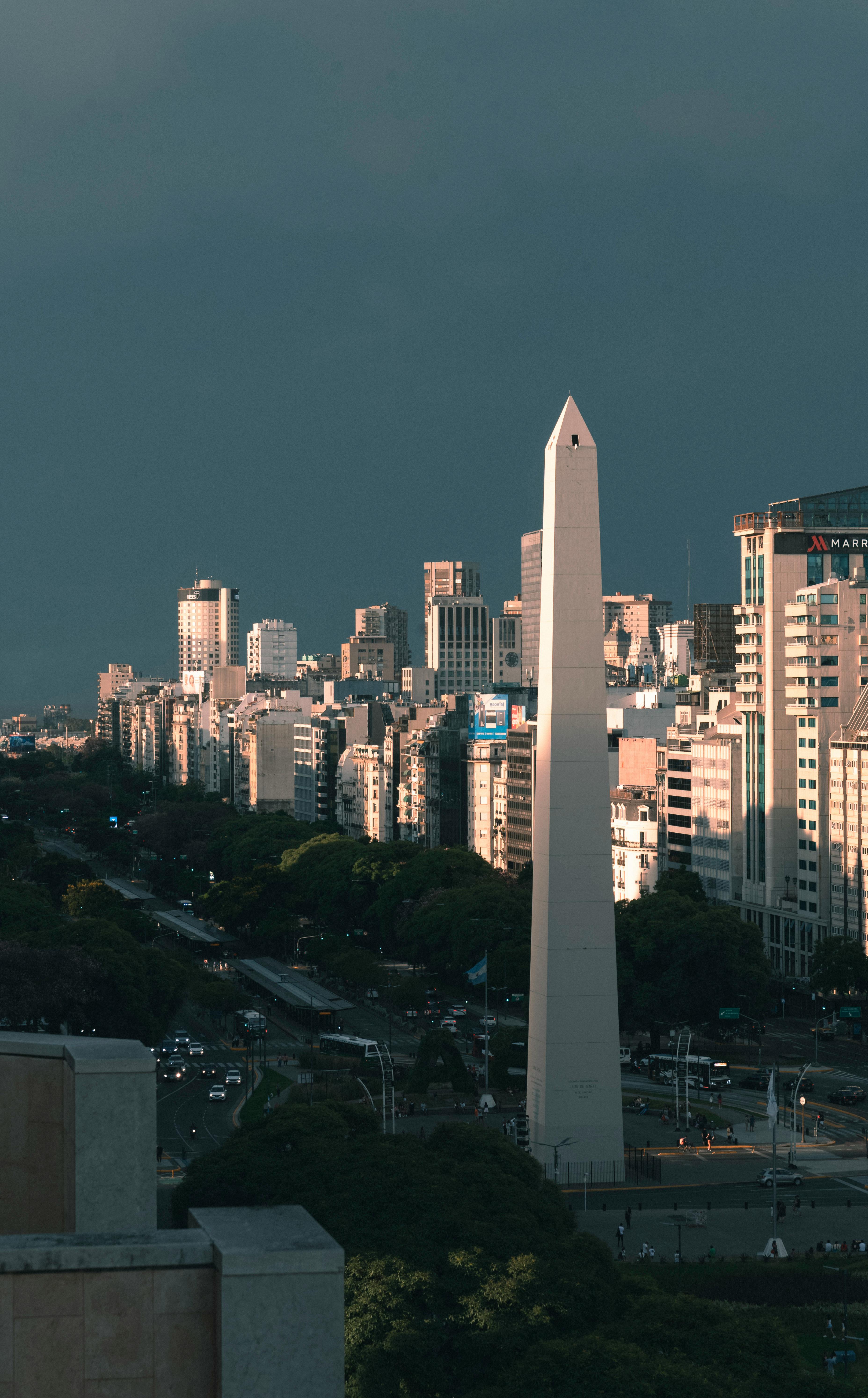 Skyscrapers of an Apartment Complex and Womans Bridge in Buenos Aires at Night · Free Stock Photo
