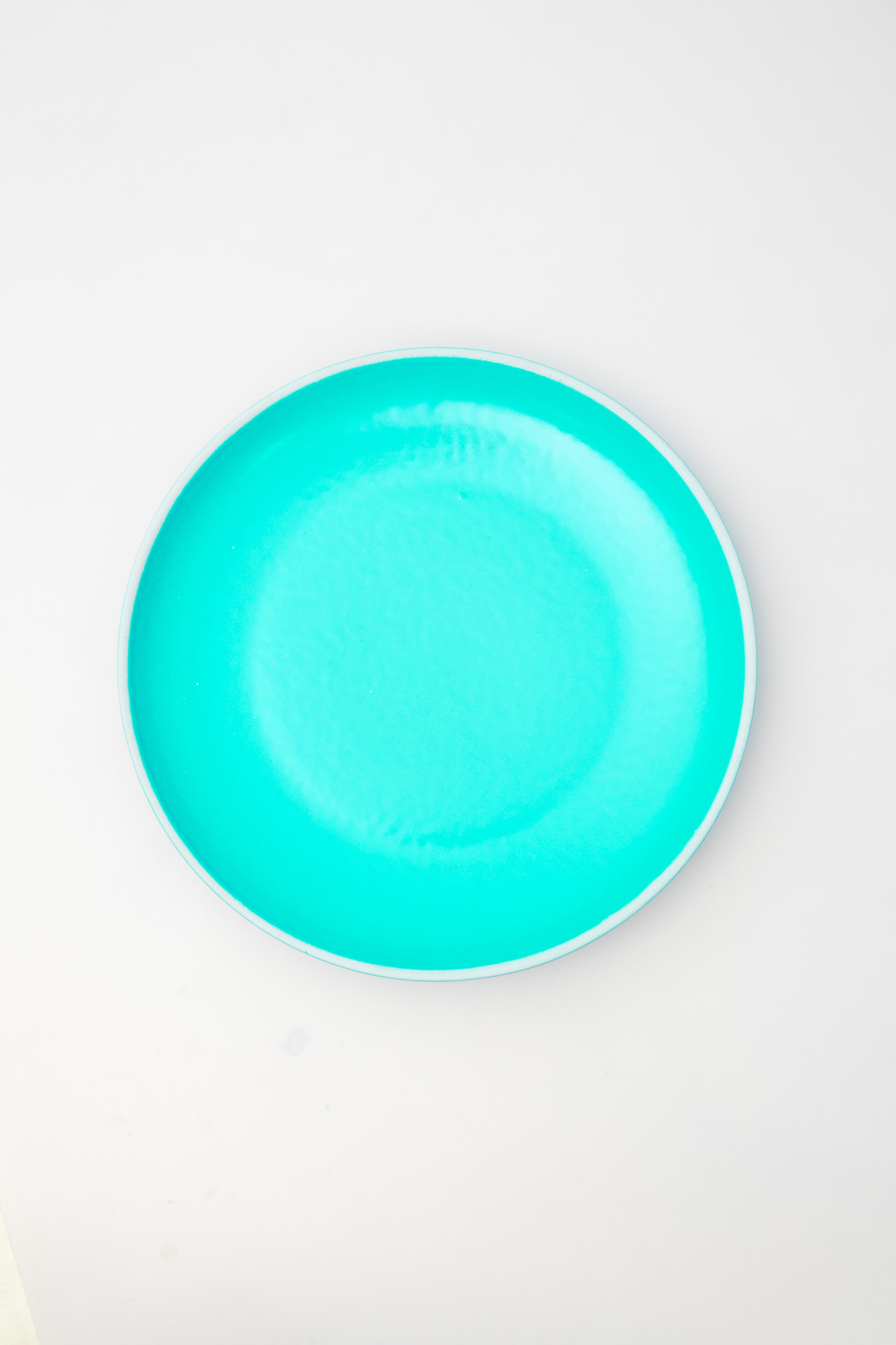 Blue Plate on White Background · Free Stock Photo