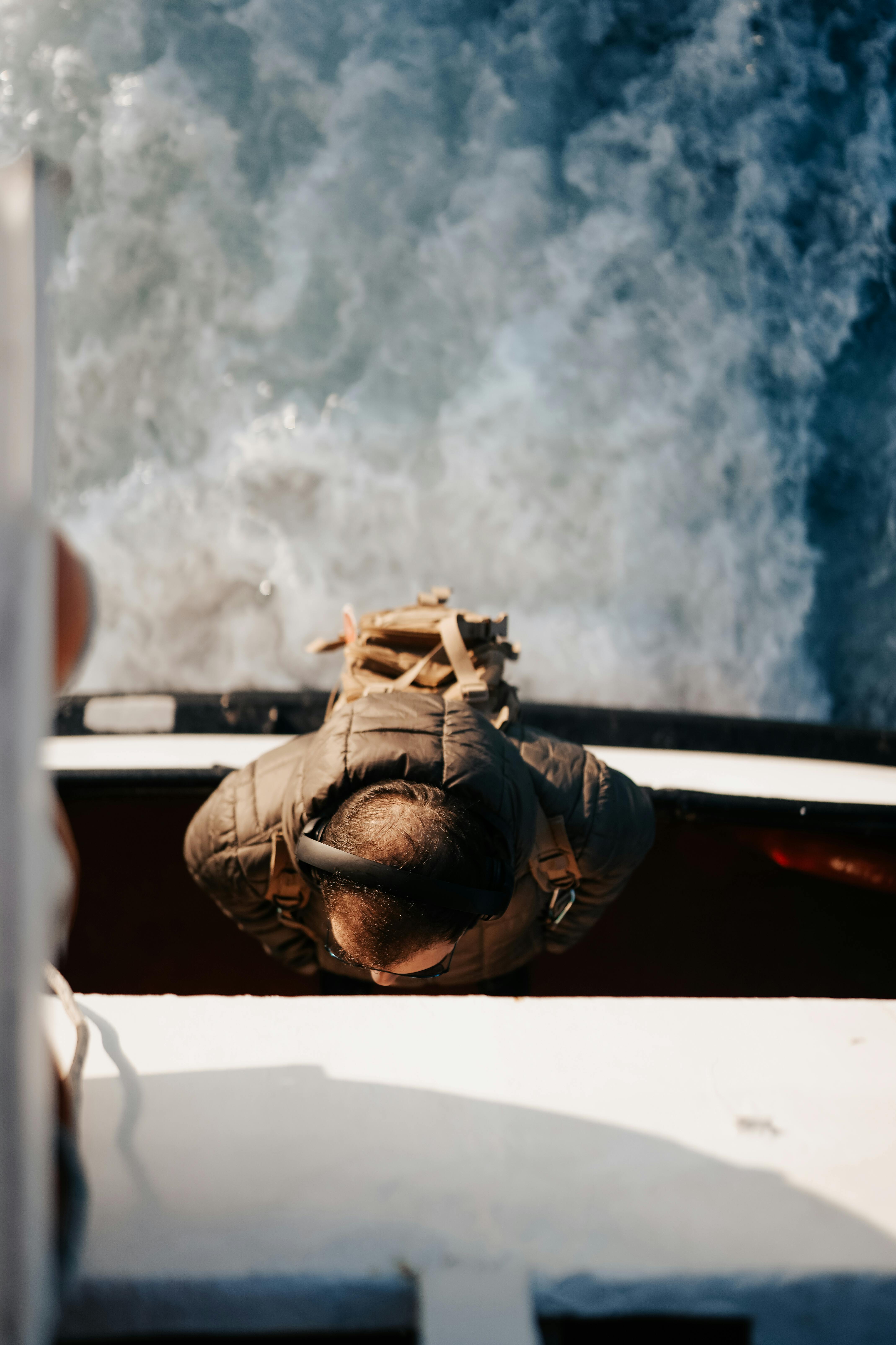 Man Looking at the Sea on a Ship · Free Stock Photo