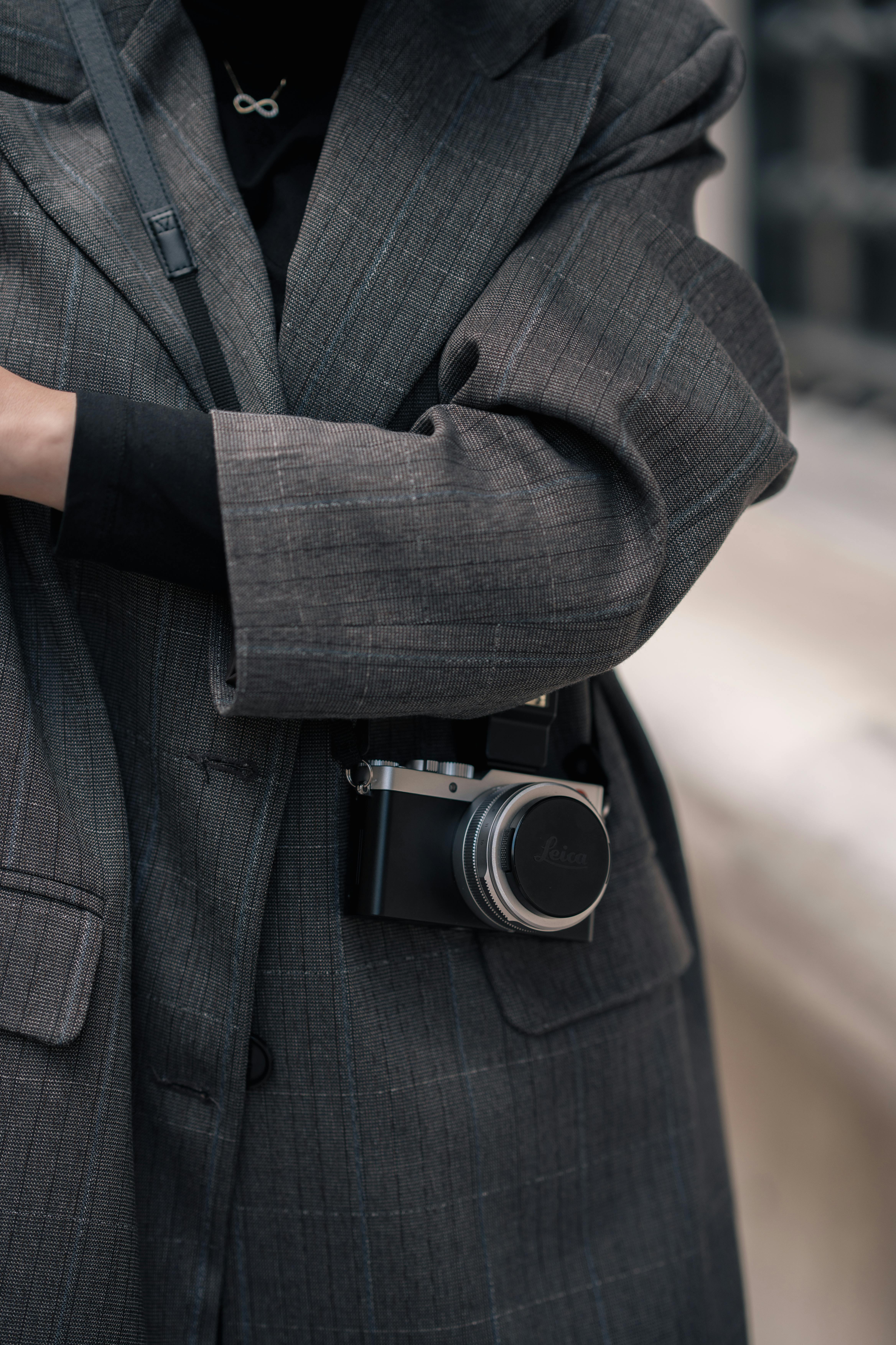 Person Wearing Coat and Old Fashioned Camera on City Street · Free ...