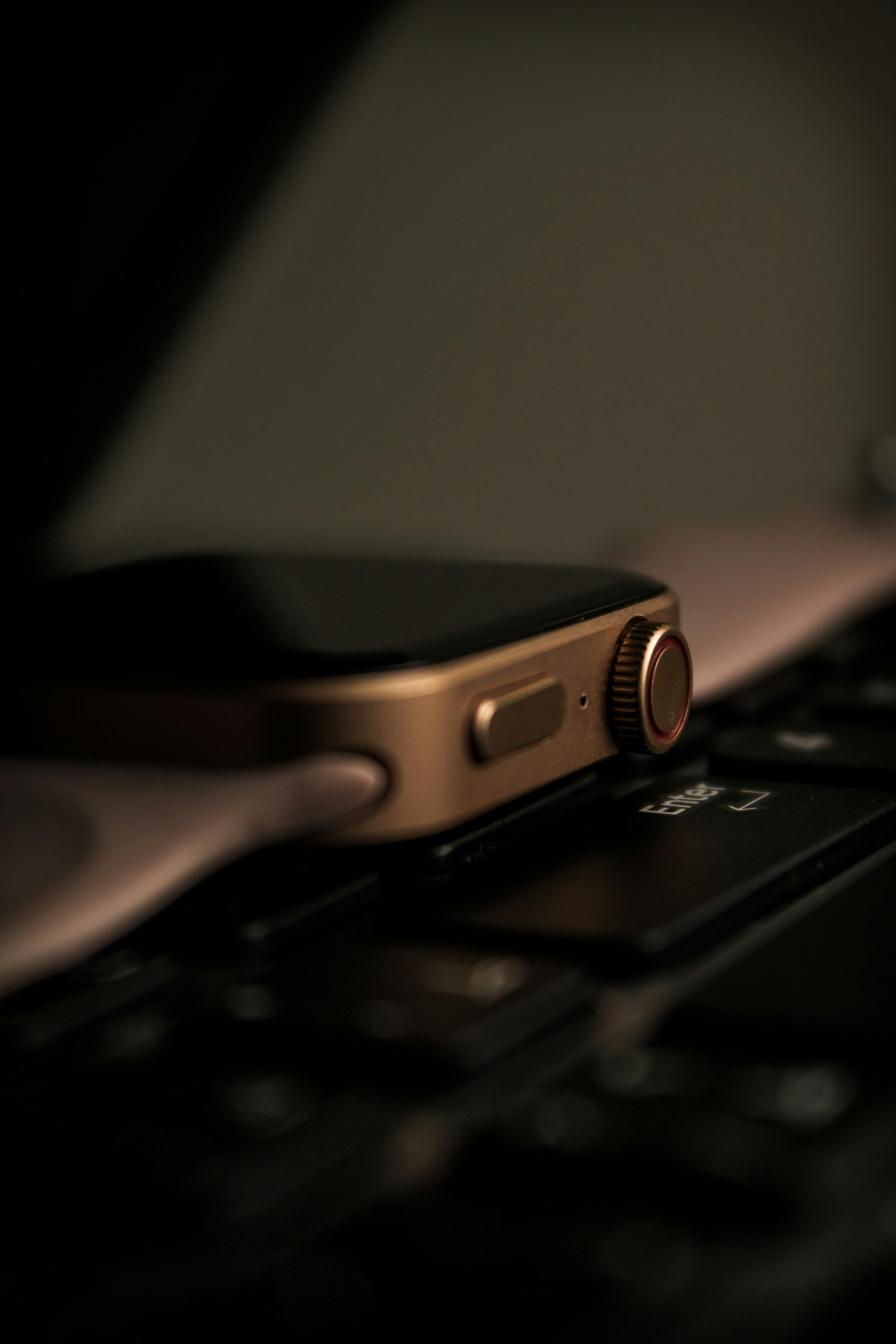 Smartwatch on Keyboard · Free Stock Photo