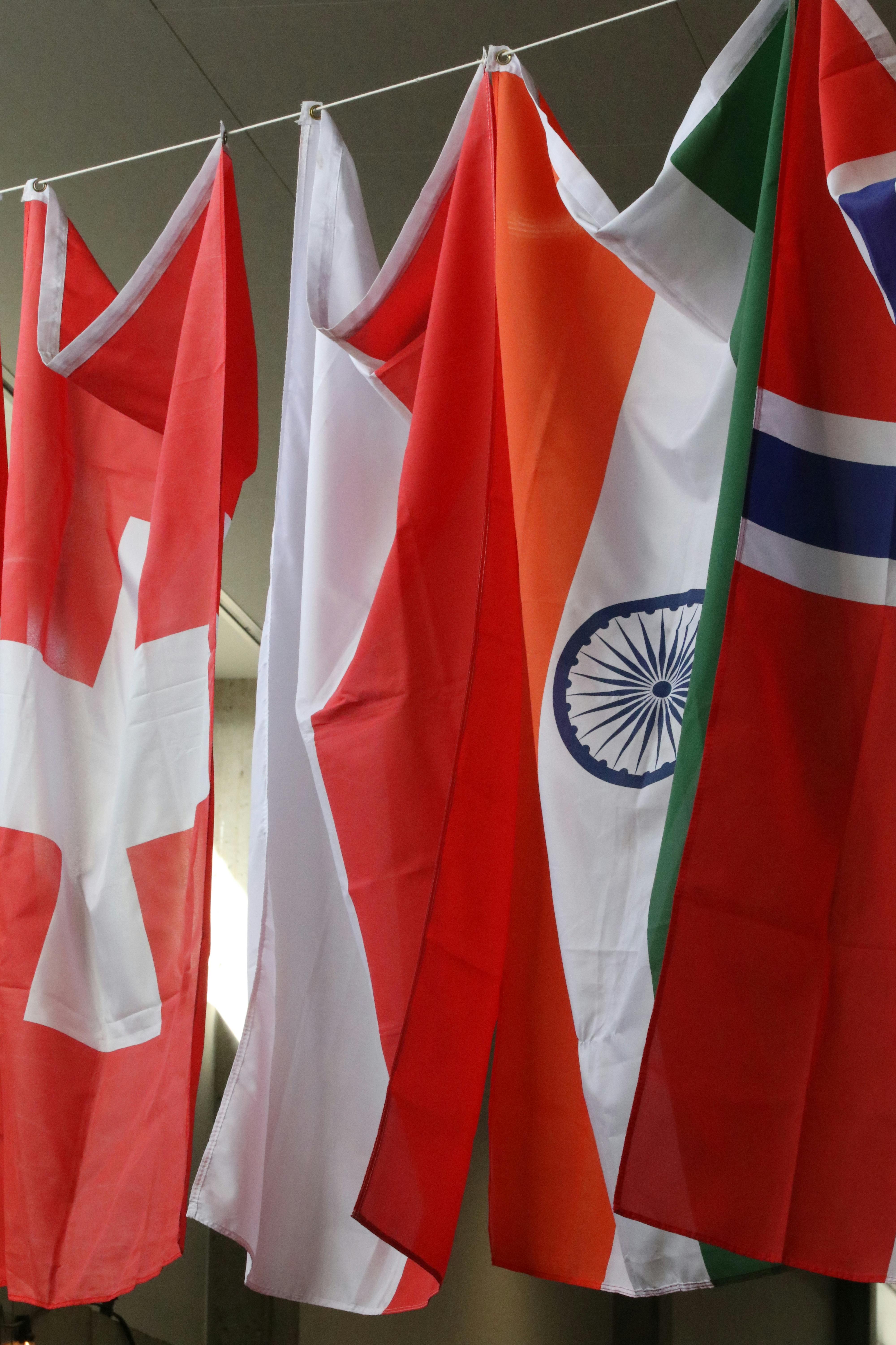 National Flags Hanging Indoors · Free Stock Photo