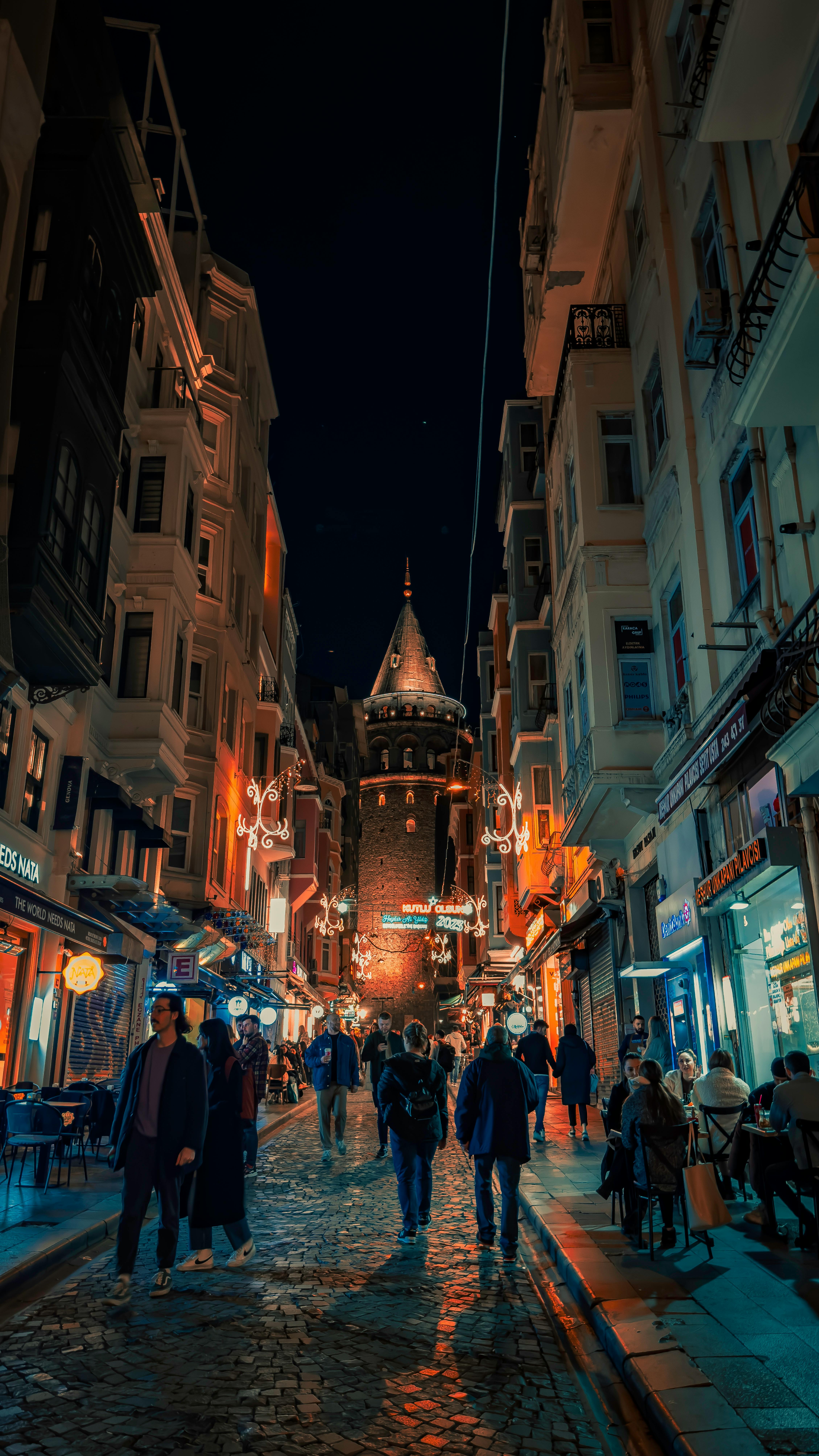 Illuminated Alley in Istanbul with View of the Galata Tower at Night ...