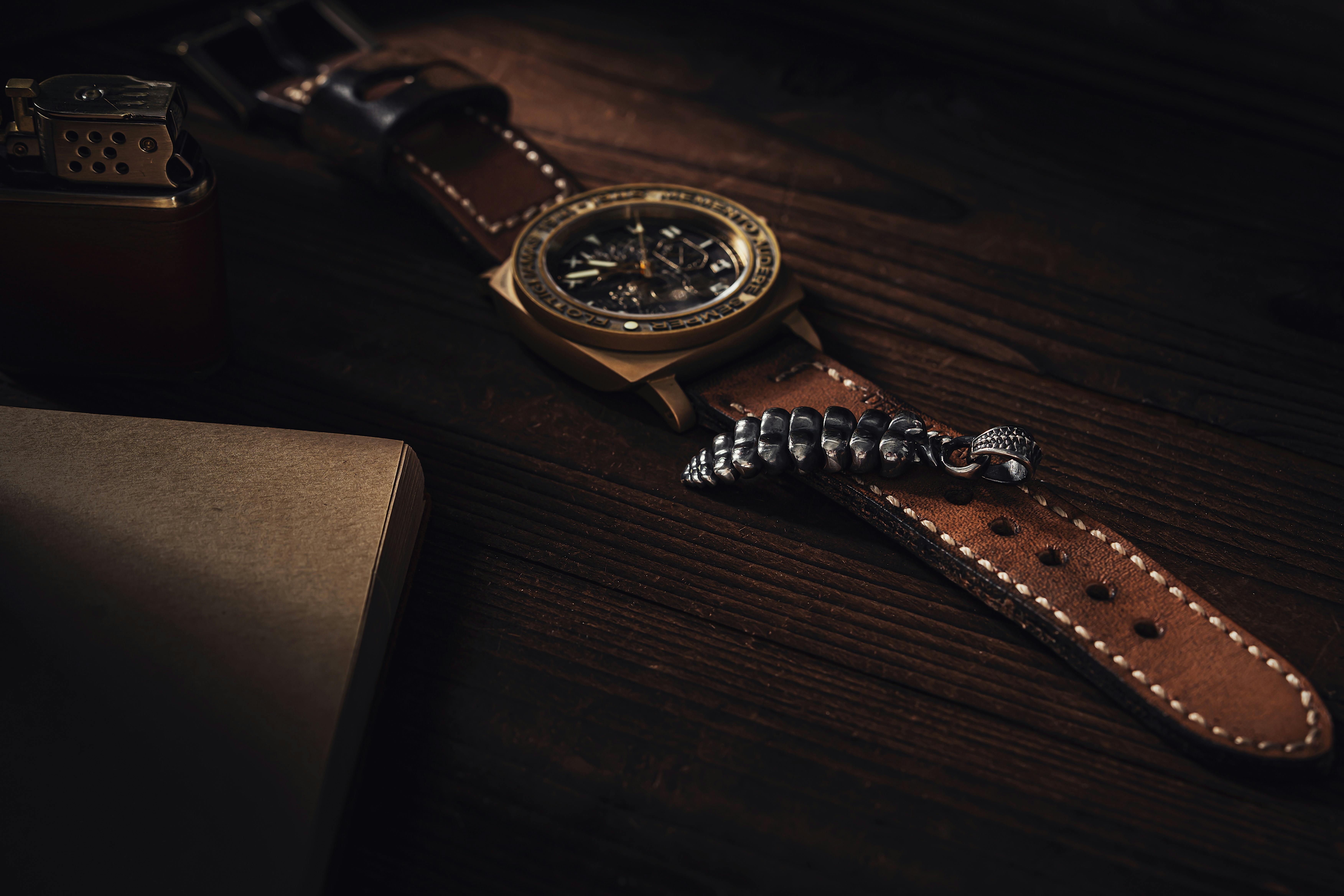 Wristwatch, Pendant and Lighter · Free Stock Photo