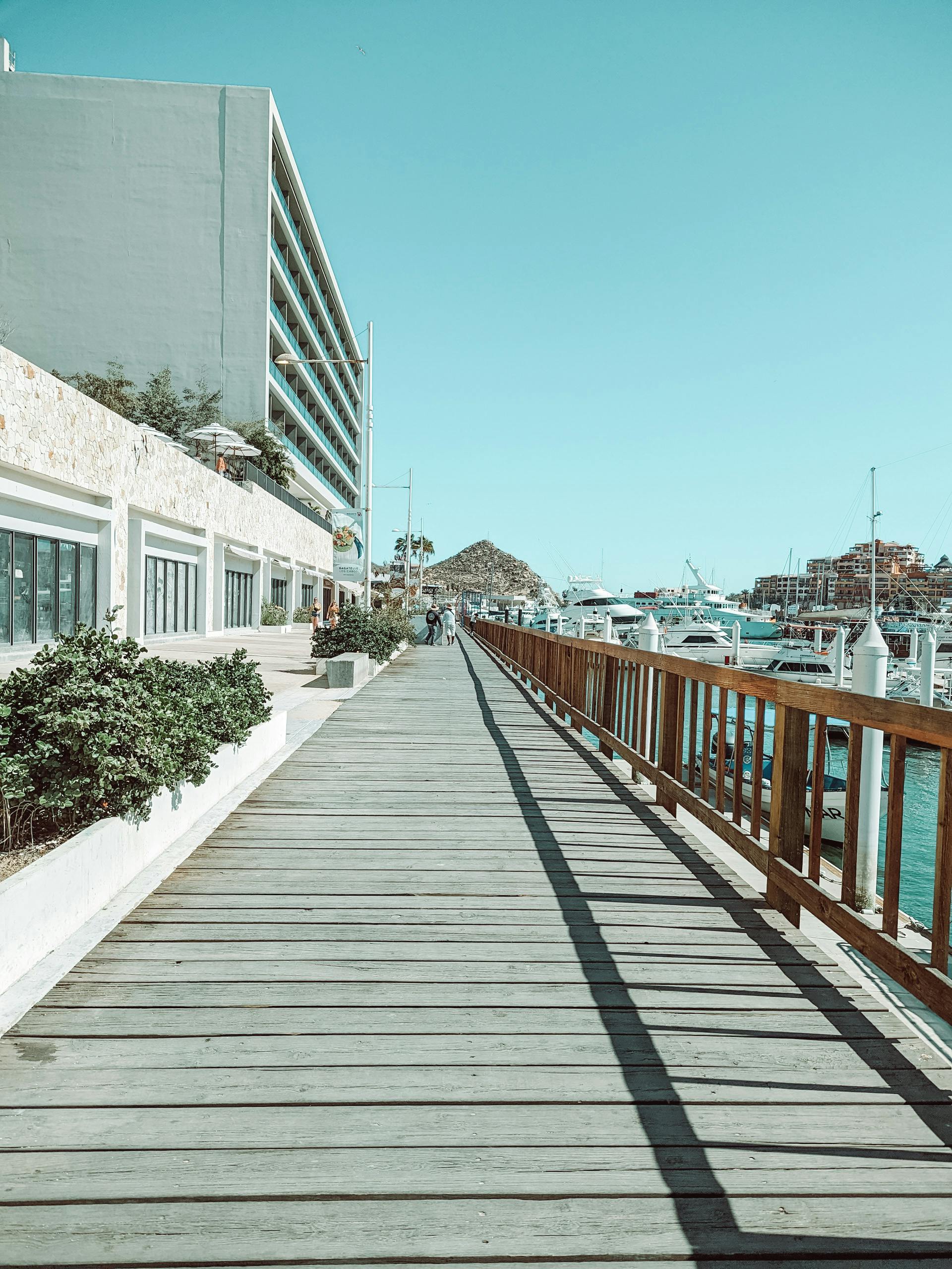 Construction Crane behind Buildings · Free Stock Photo
