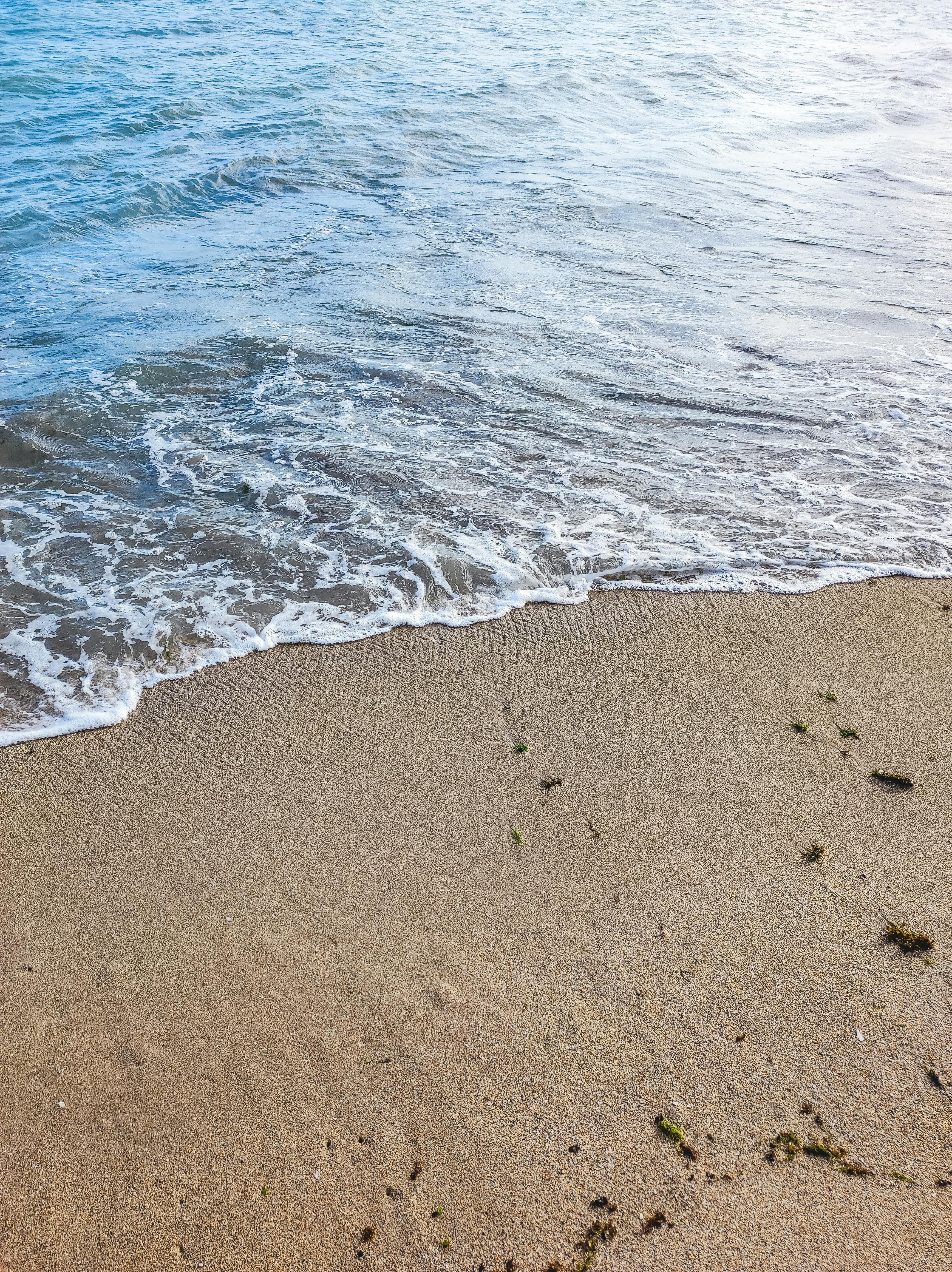 Beach Sand Amoothed by Ocean Waves · Free Stock Photo