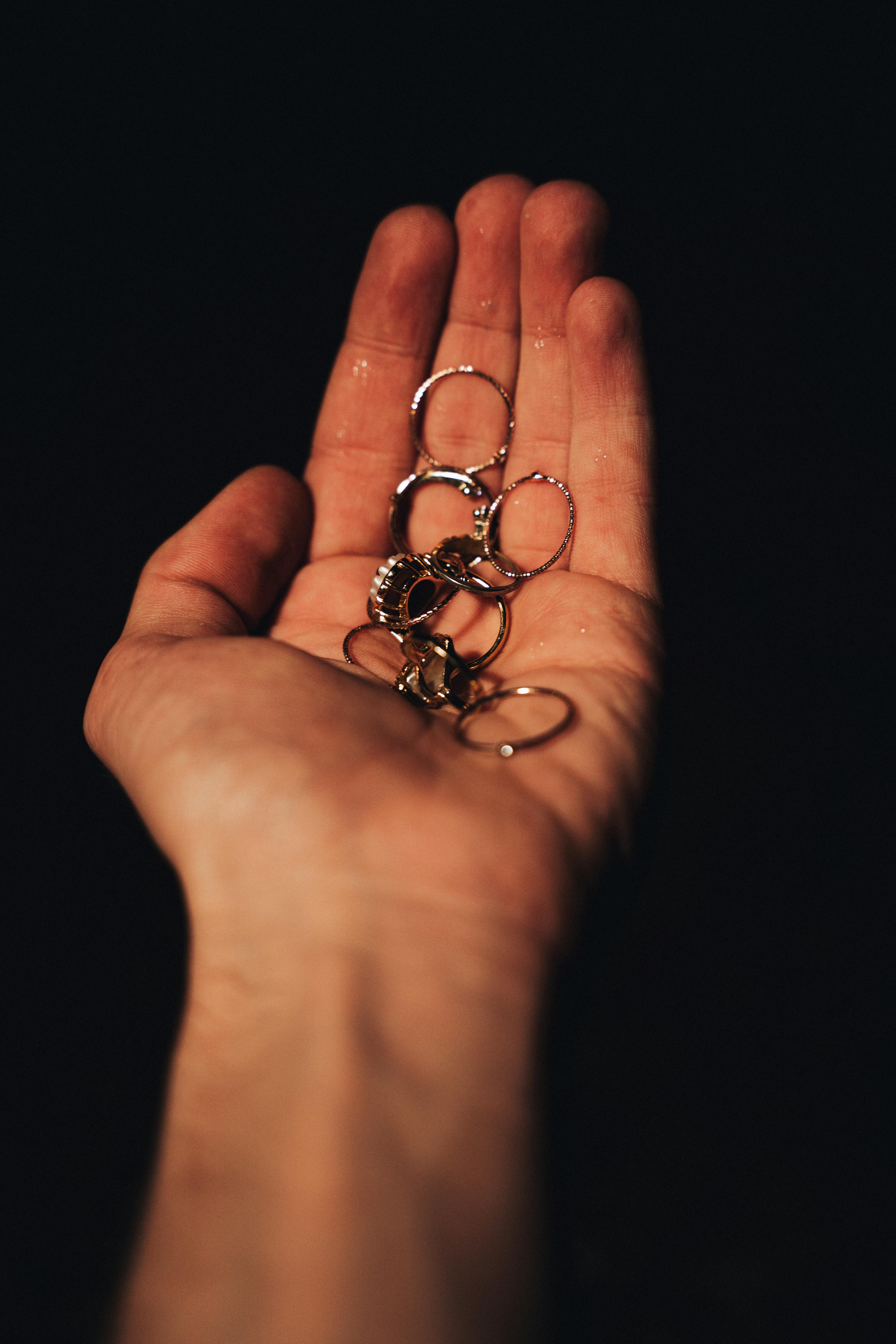 Hand Holding Rings · Free Stock Photo
