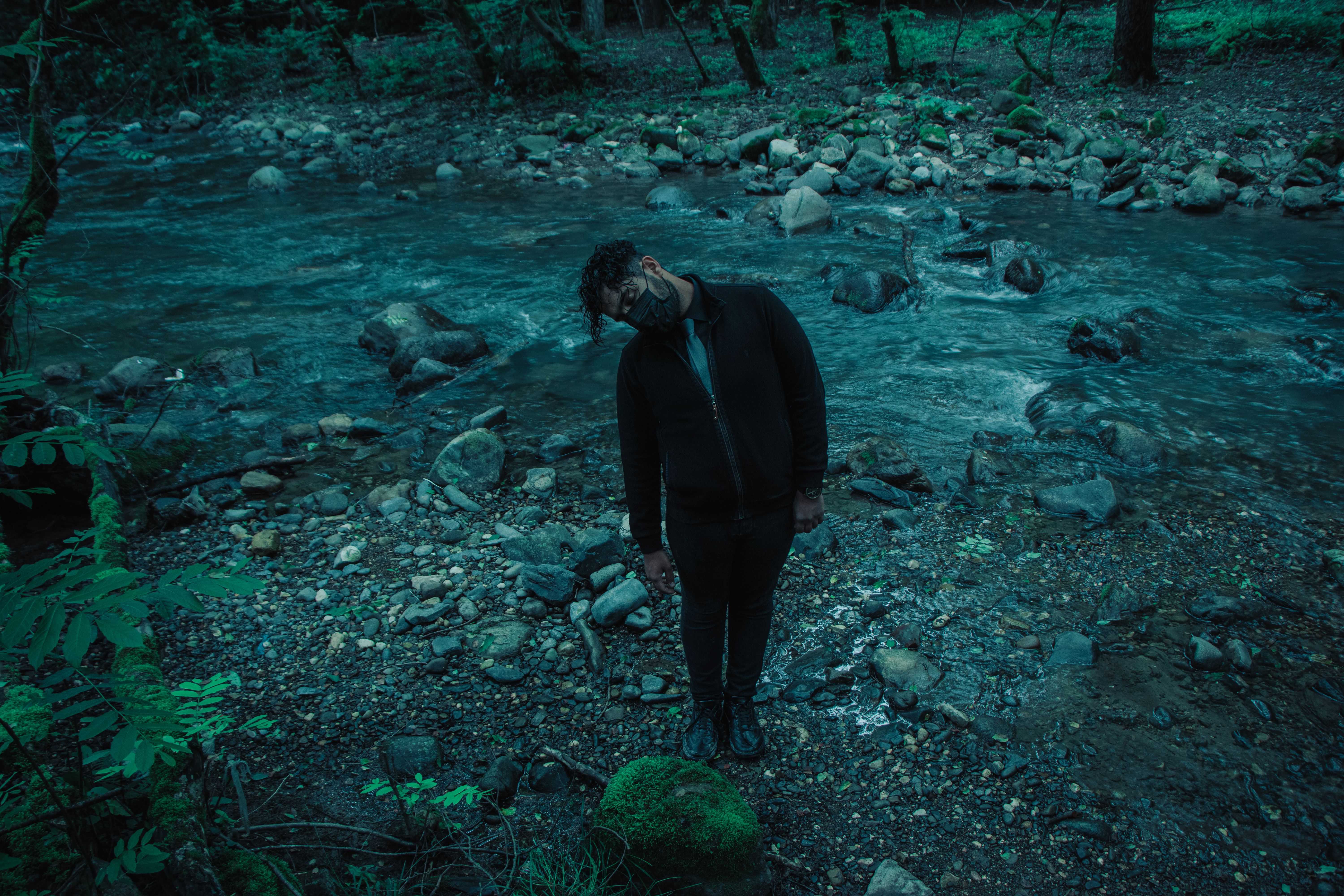 Man Wearing Face Mask with Crocked Neck Standing on Riverbank · Free ...