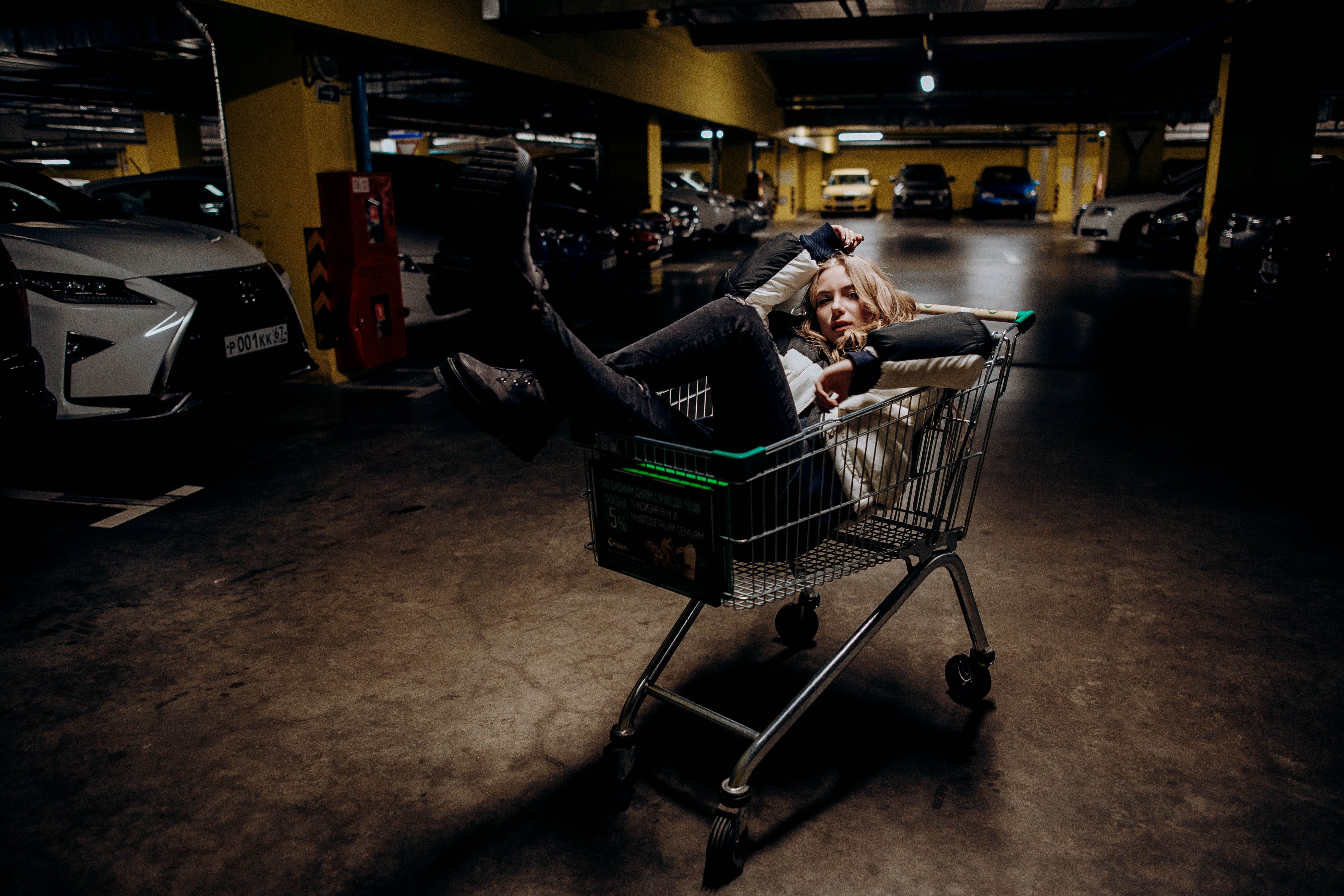 Blonde Woman in Shopping Cart · Free Stock Photo
