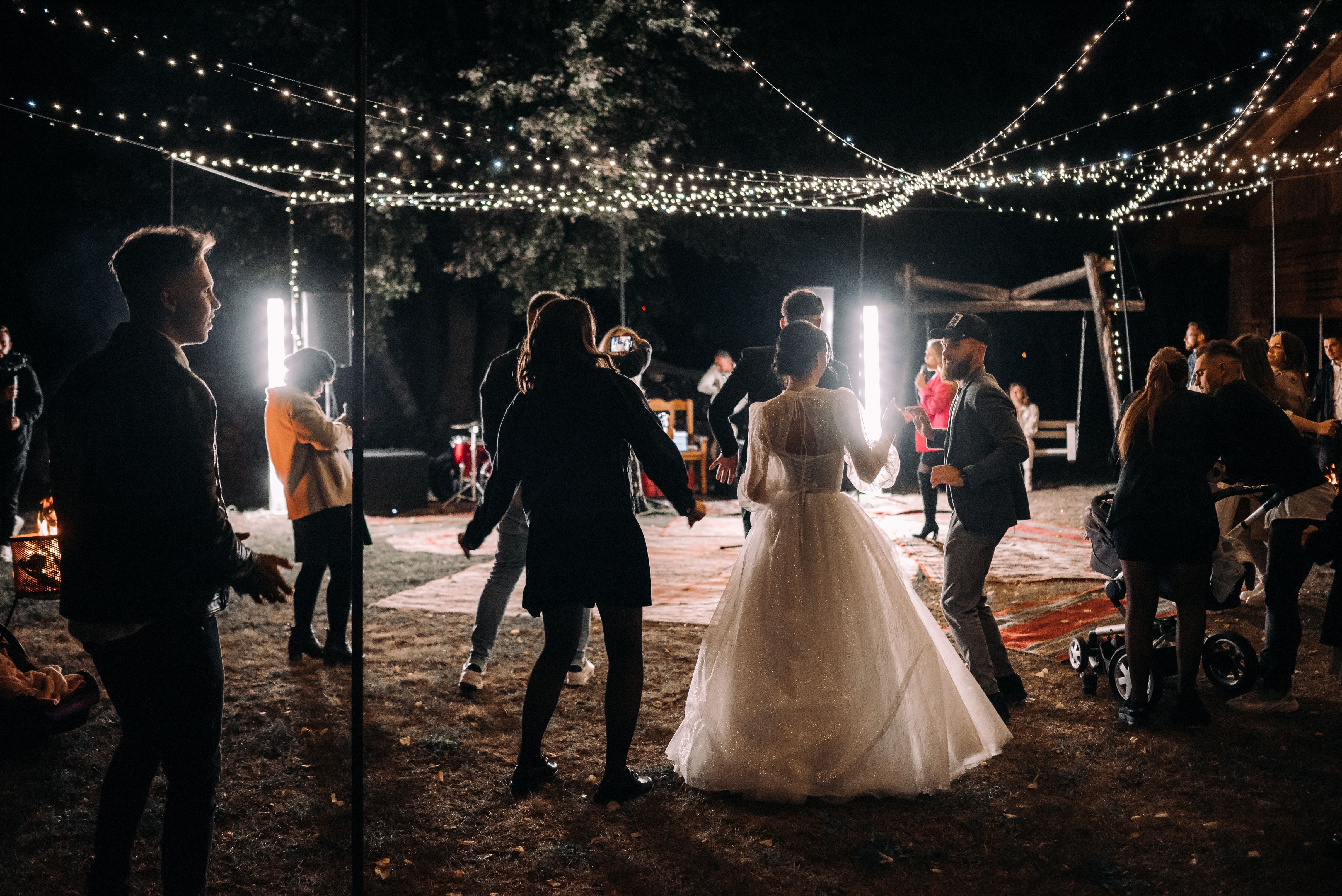 Bride Dancing with Wedding Guests at the Reception · Free Stock Photo