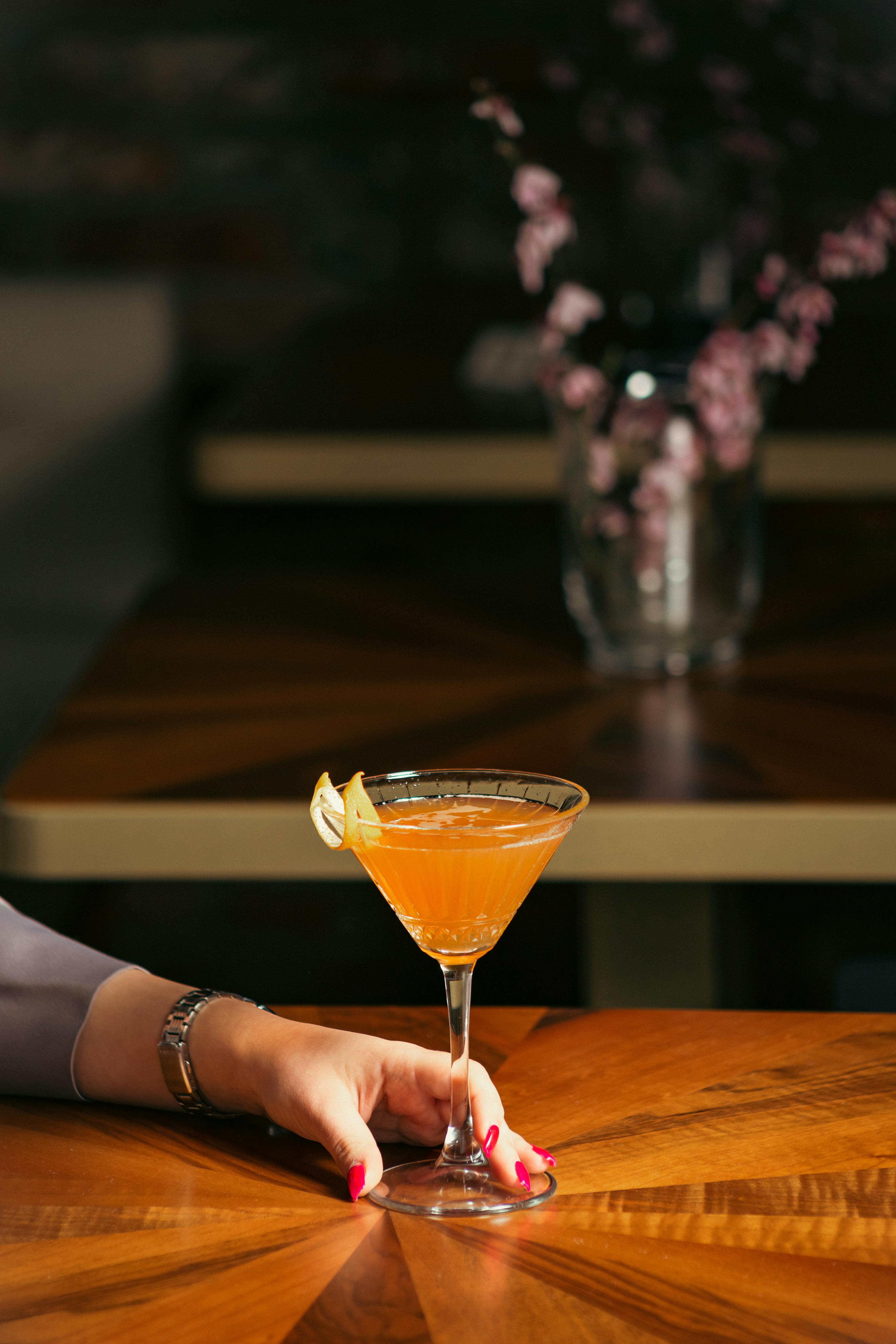 Woman Mixing a Drink · Free Stock Photo