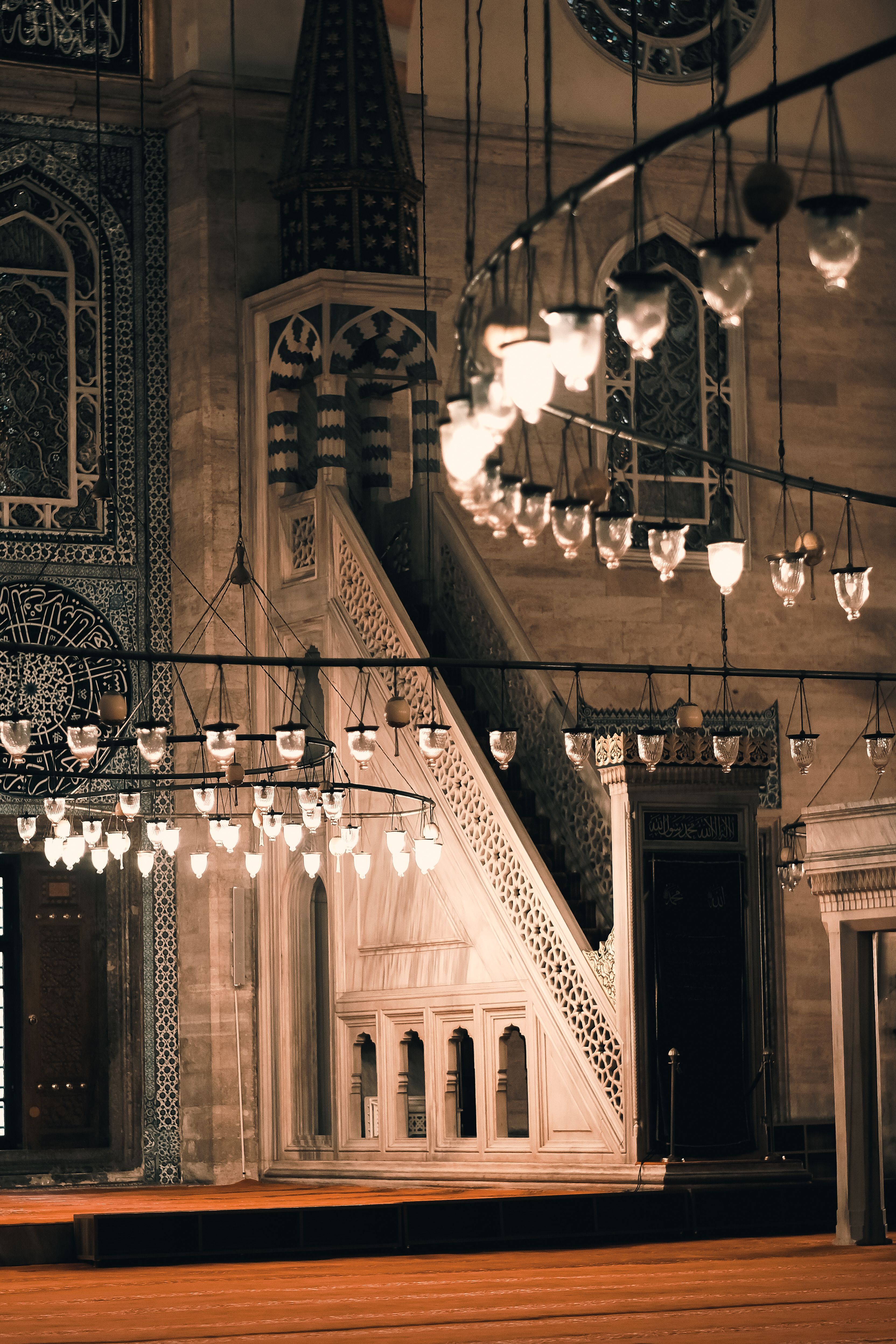 Koran on Wooden Shelf in Mosque · Free Stock Photo