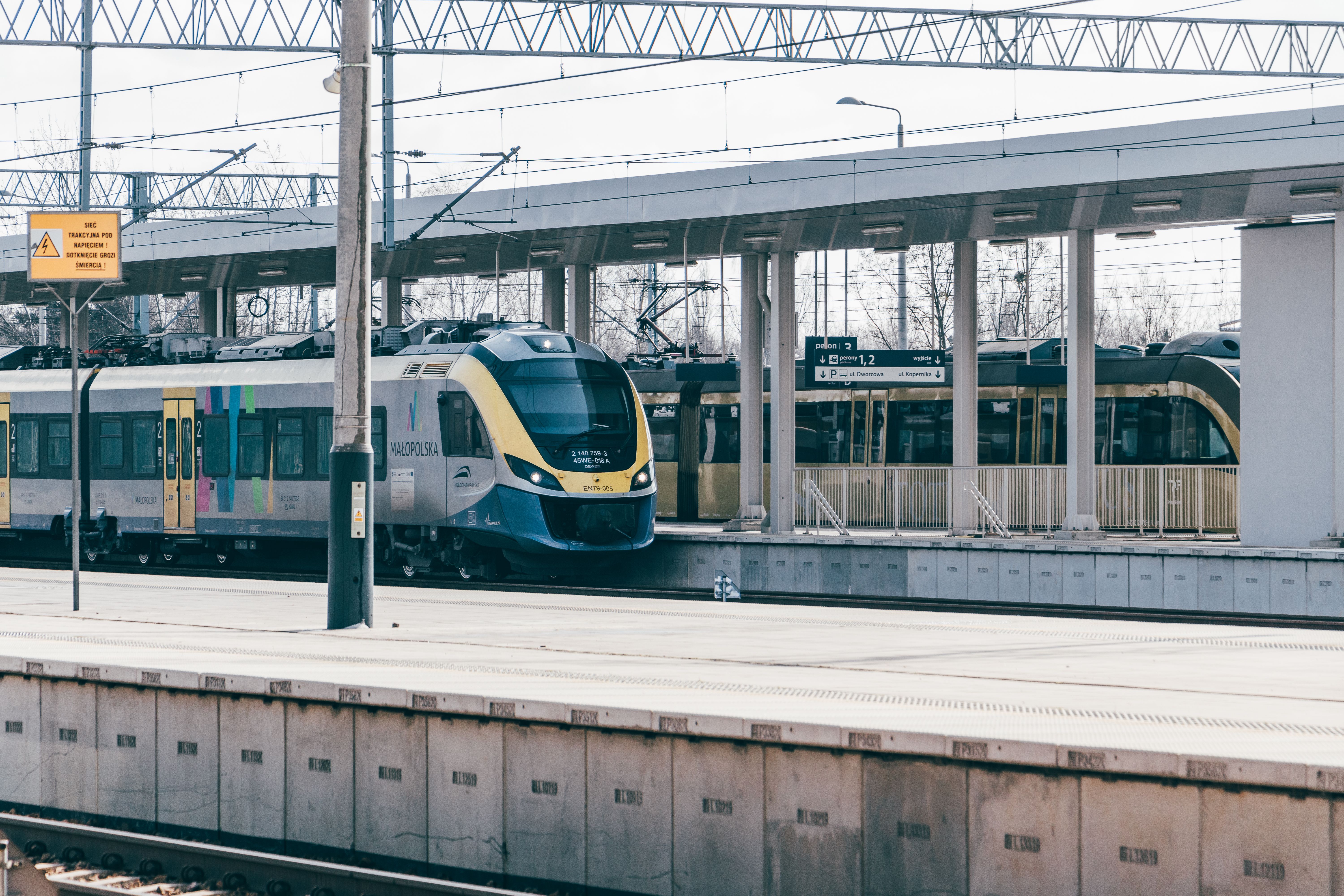 Passenger Train at a Railway Station in Poland · Free Stock Photo