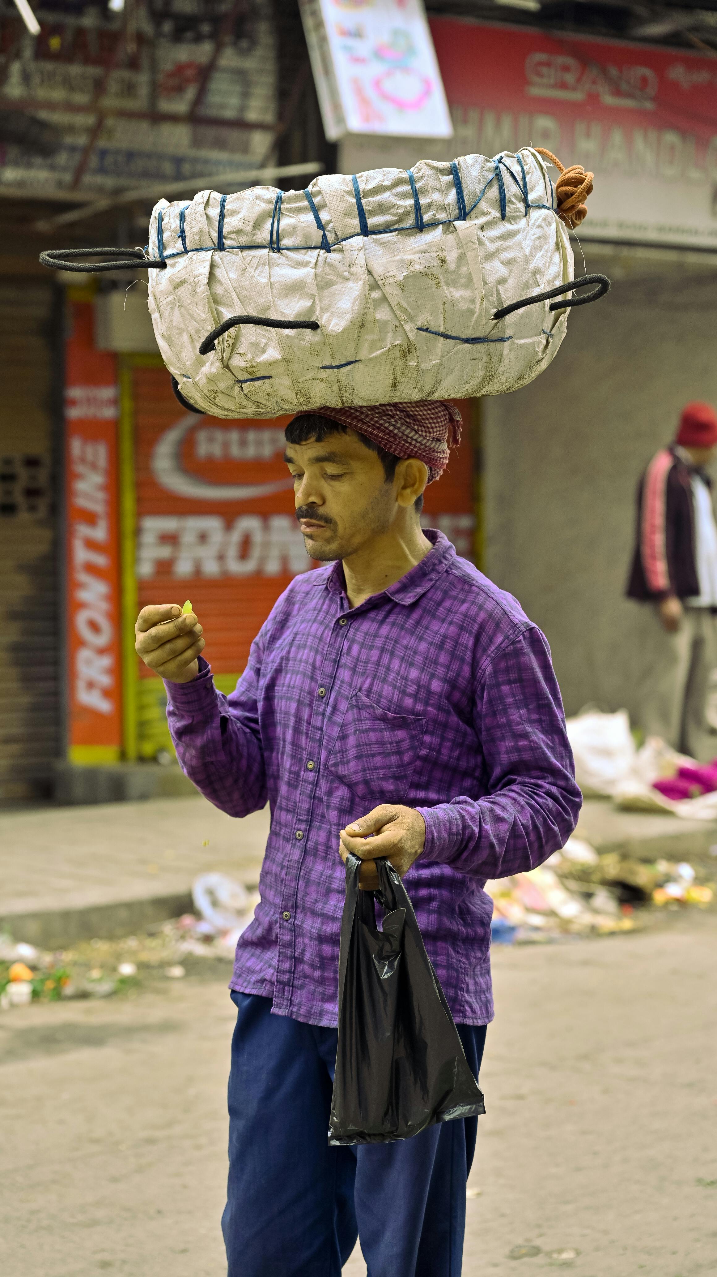 Man Carrying Basket on Head · Free Stock Photo