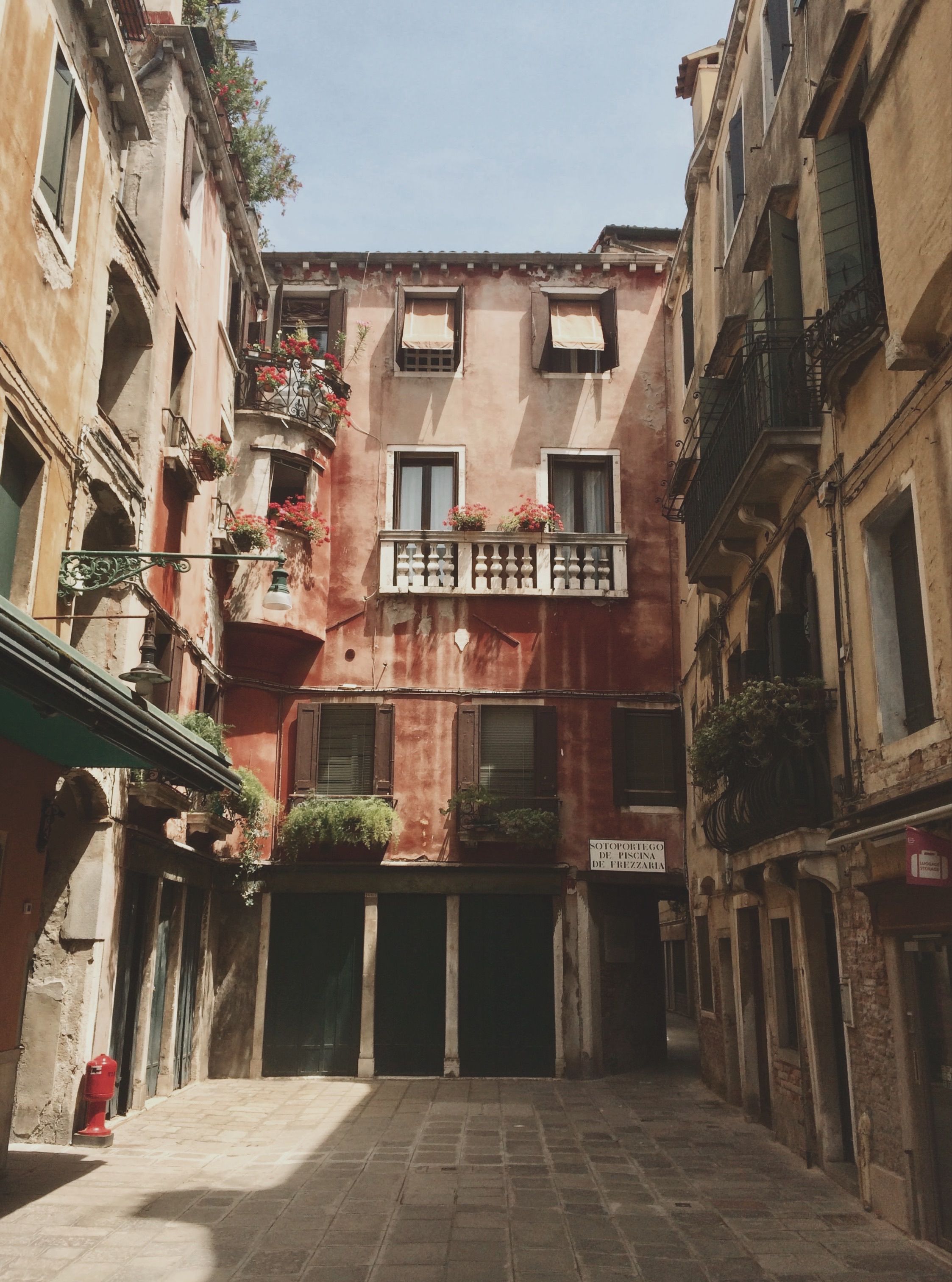 Pavement between Buildings · Free Stock Photo